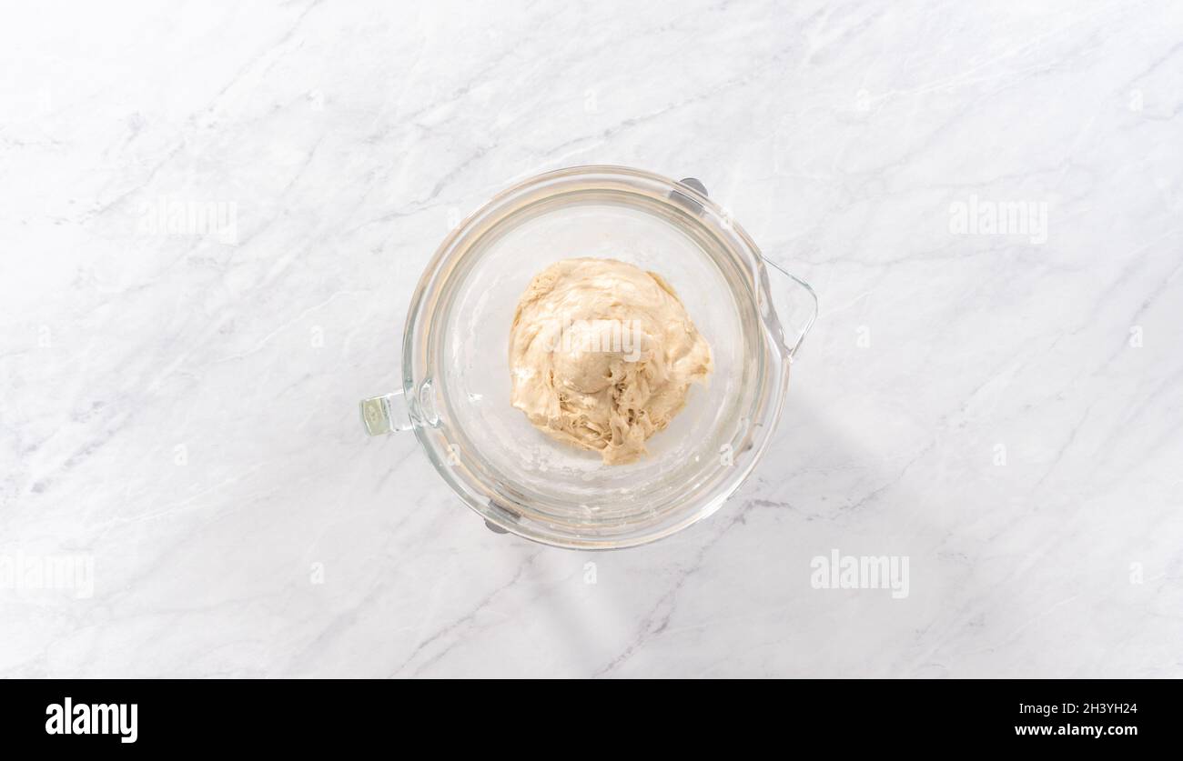 Flat lay. Mixing bread dough in a stand-alone kitchen mixer to bake ...