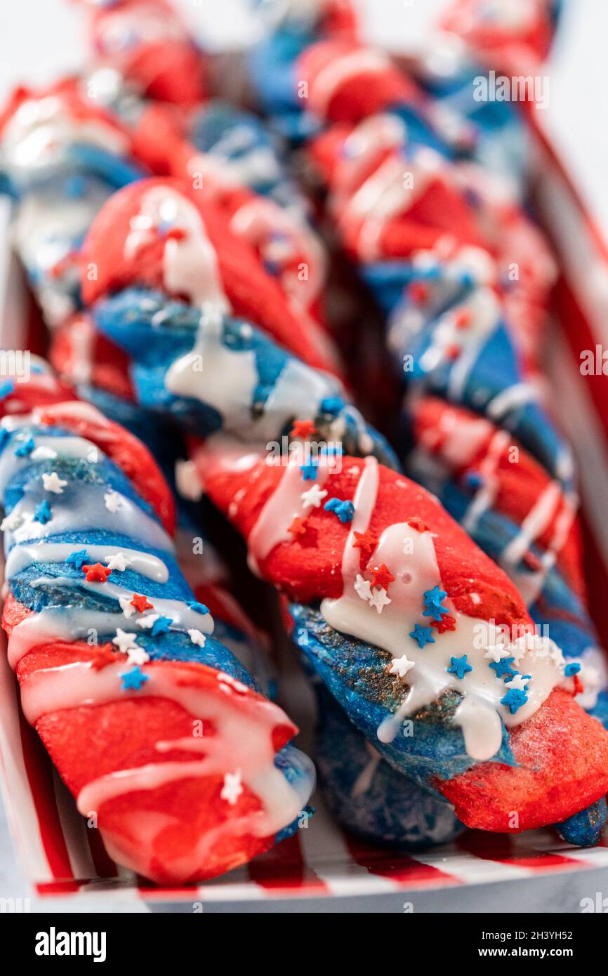 Patriotic cinnamon twists drizzled with a white glaze and decorated ...
