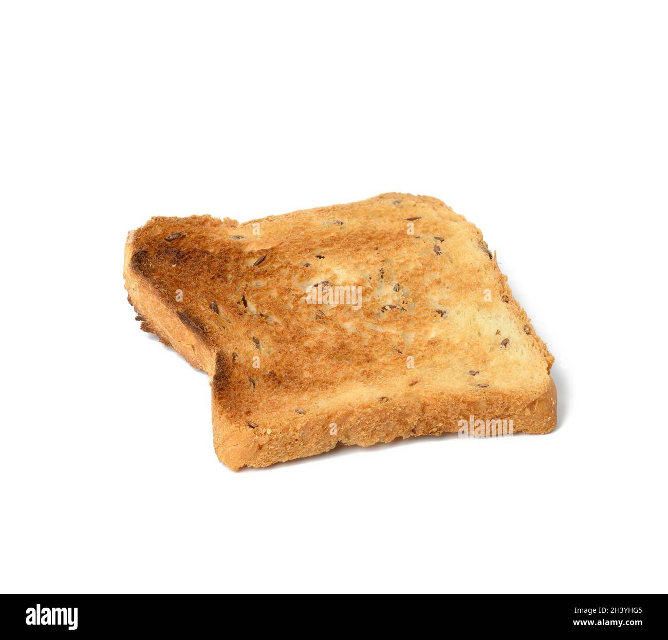 Square slices of bread made from white wheat flour toasted in toaster ...