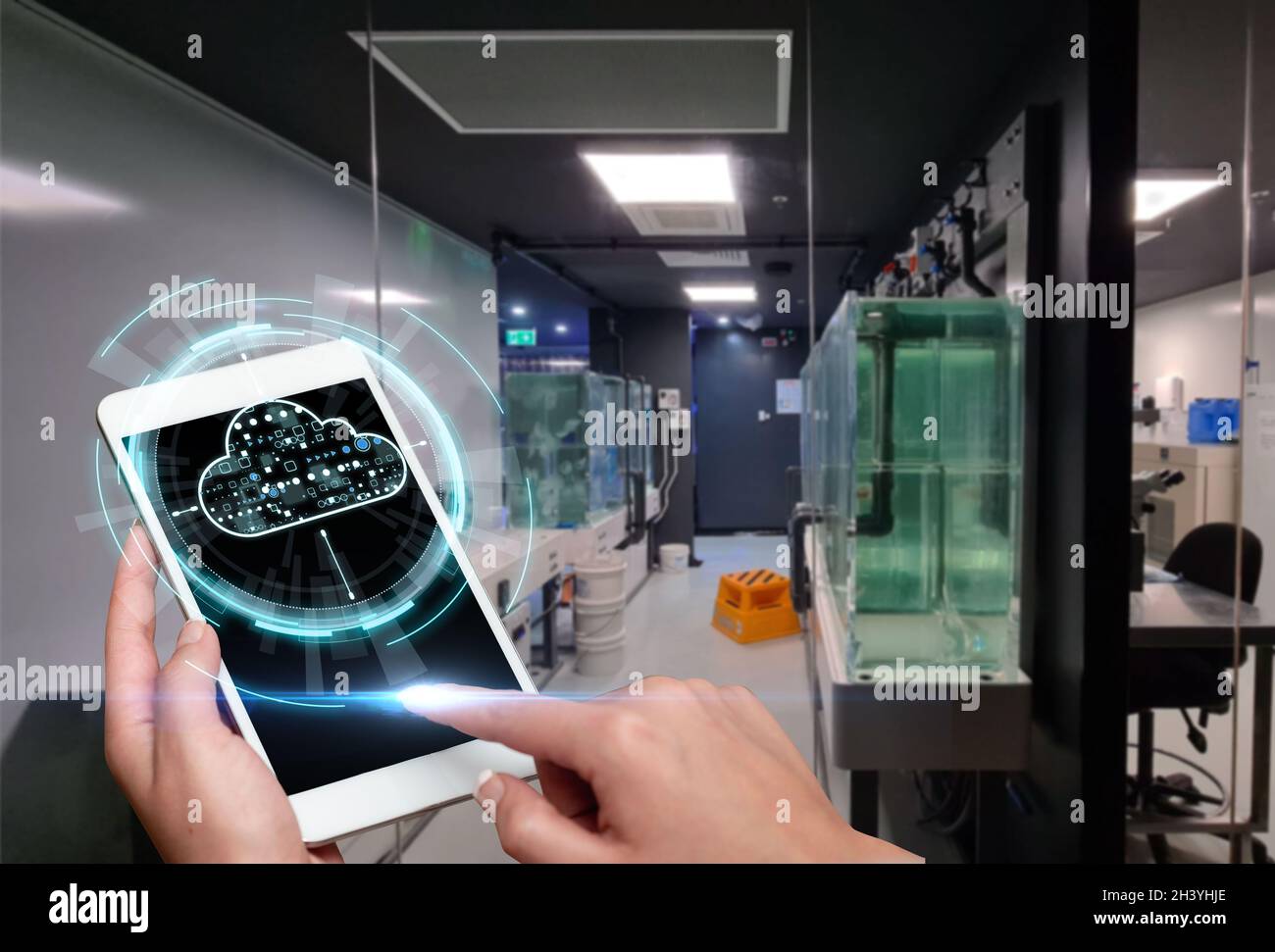 Hand Touching Screen Of Mobile Phone In Laboratory Showing Futuristic ...