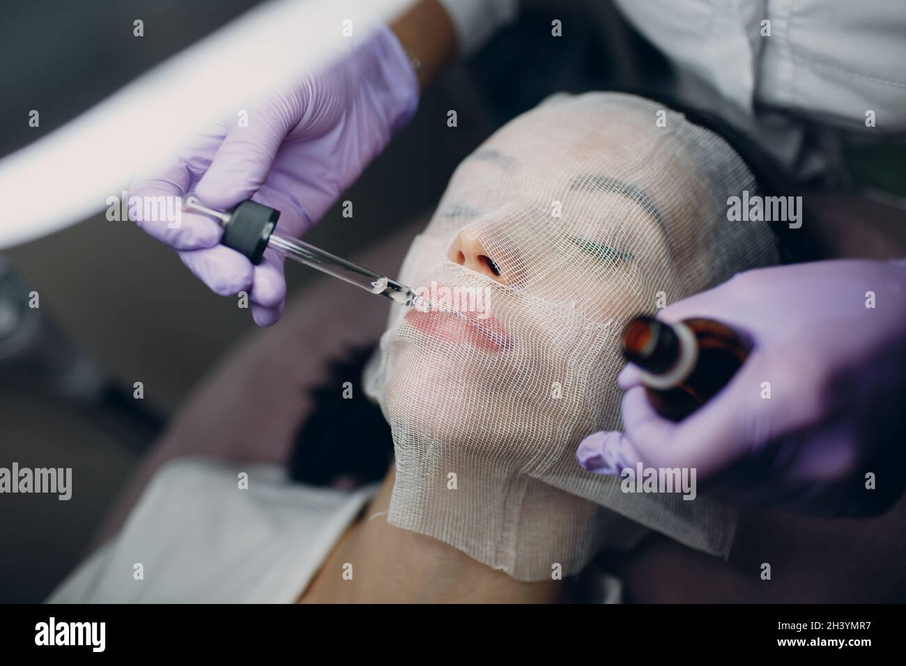 Paraffin Face Mask Gauze Bandage Therapy Young Woman Receiving Facial Skin Care Treatment