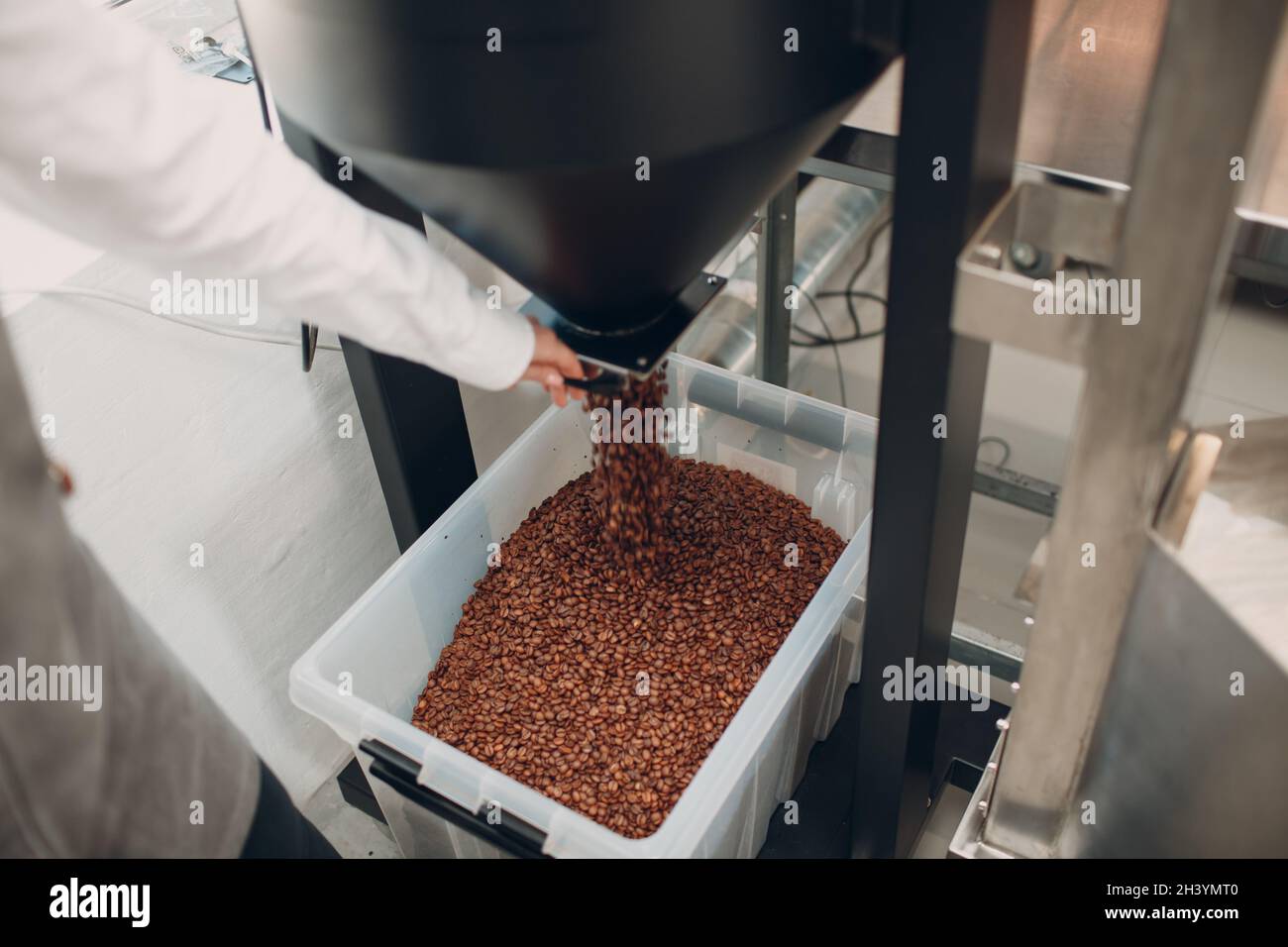 Coffee destoner machine at coffee roasting process Stock Photo - Alamy