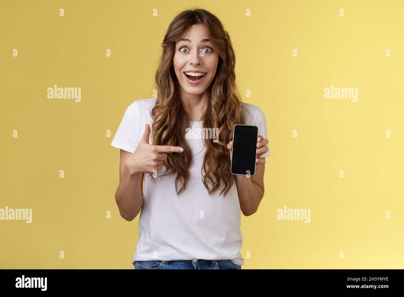 Surprised happy lucky girl winning online internet lottery smiling ...