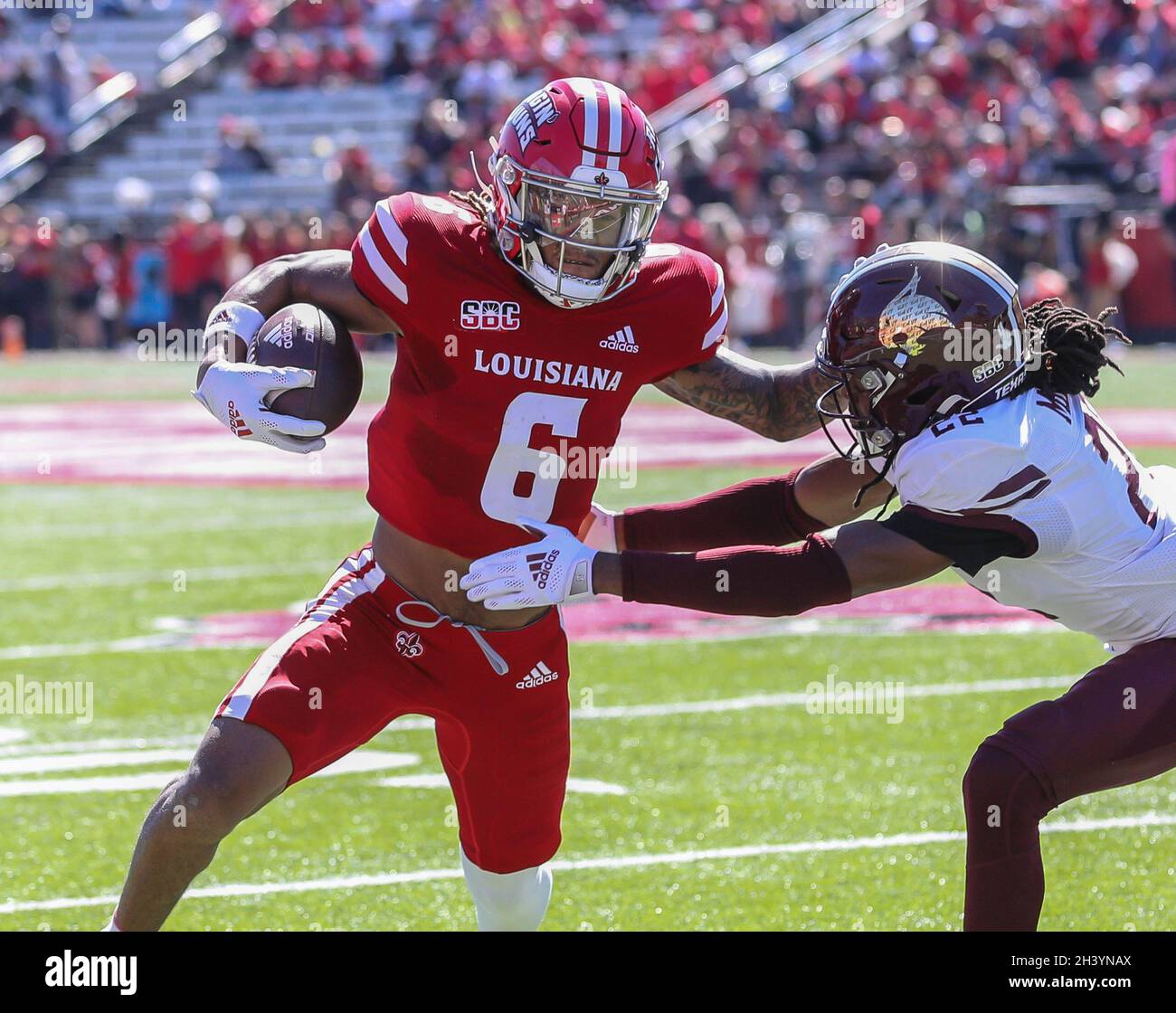October 30, 2021: Louisiana's Errol Rogers Jr. #6 tries to escape a ...