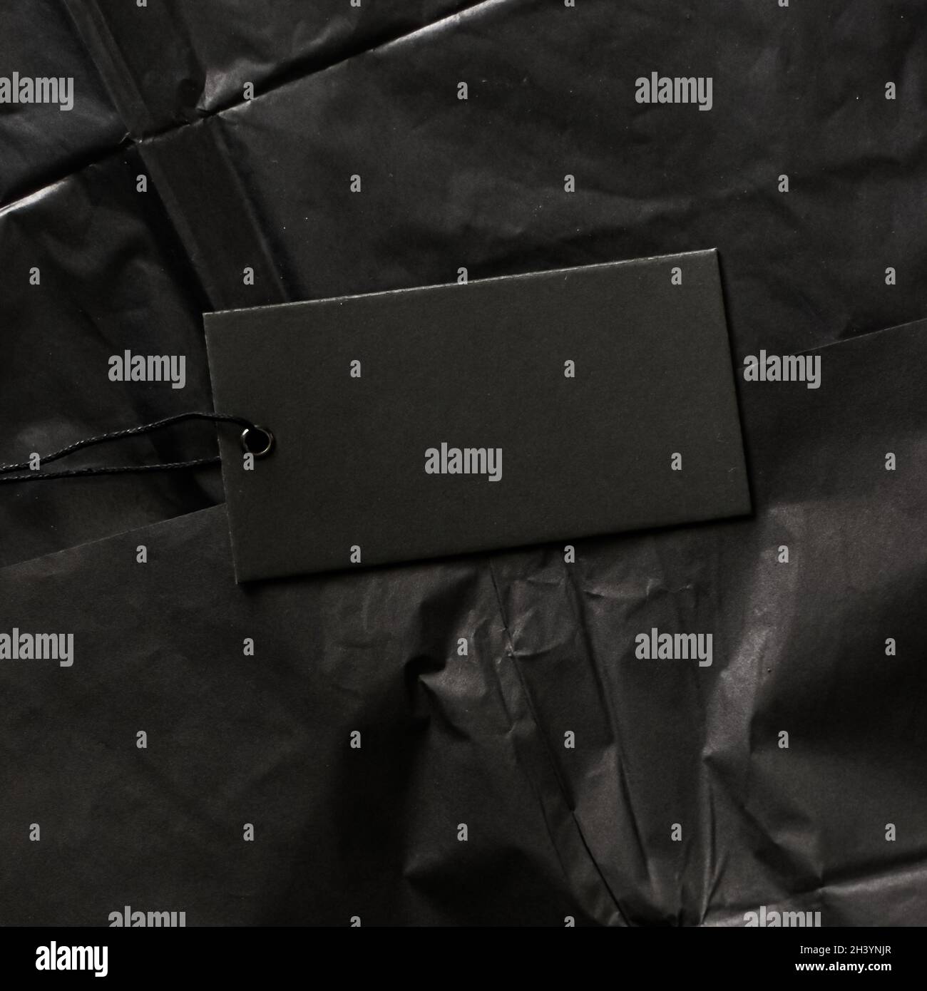 Horizontal price tag on black background Stock Photo - Alamy