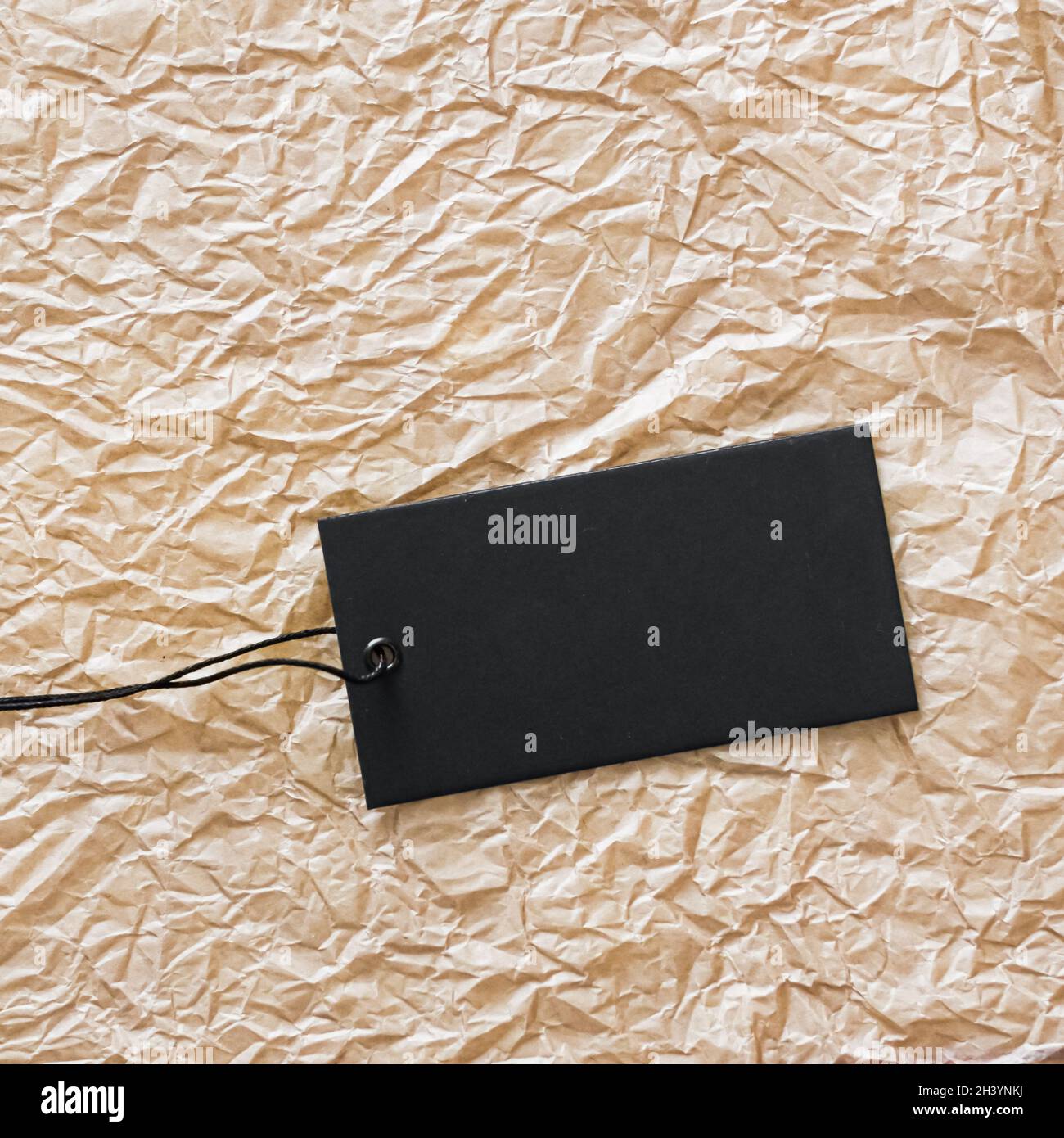 Horizontal blank price tag on eco paper background Stock Photo - Alamy