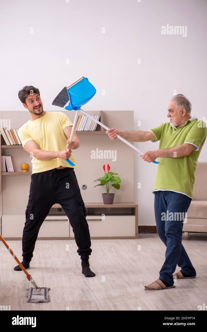 Happy janitor cleaning team hi-res stock photography and images - Alamy