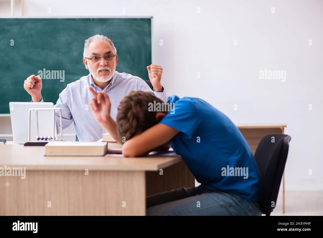 Angry school kid in class hi-res stock photography and images - Alamy