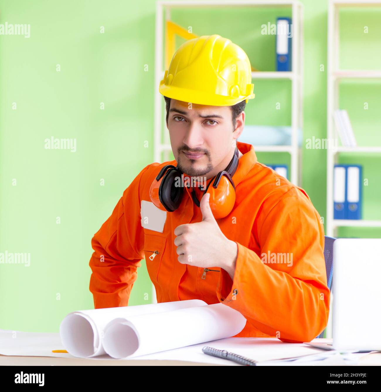 Construction supervisor planning new project in office Stock Photo - Alamy