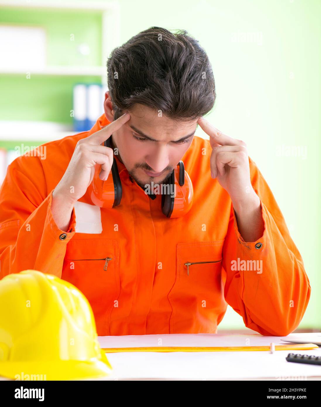Construction supervisor planning new project in office Stock Photo - Alamy
