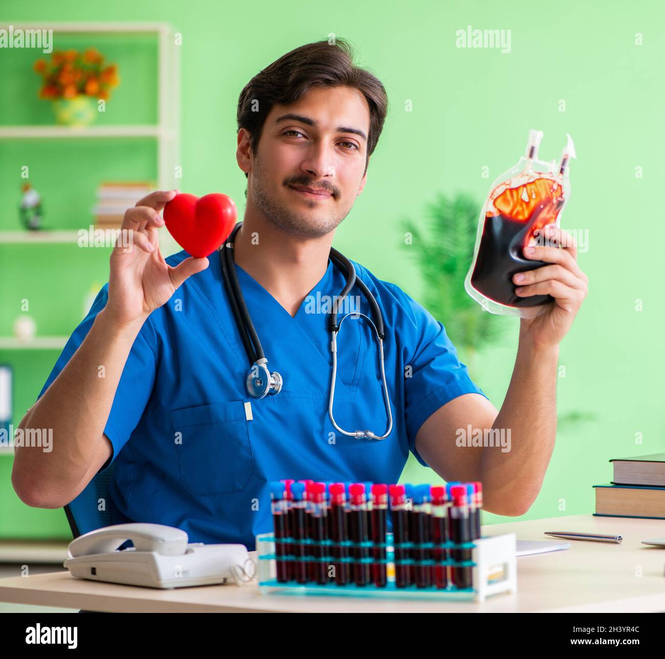 Doctor doing blood analysis in the lab Stock Photo - Alamy