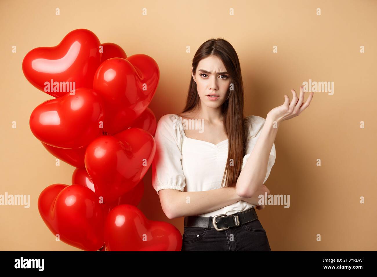Valentines day and love concept. Confused girlfriend having argument ...