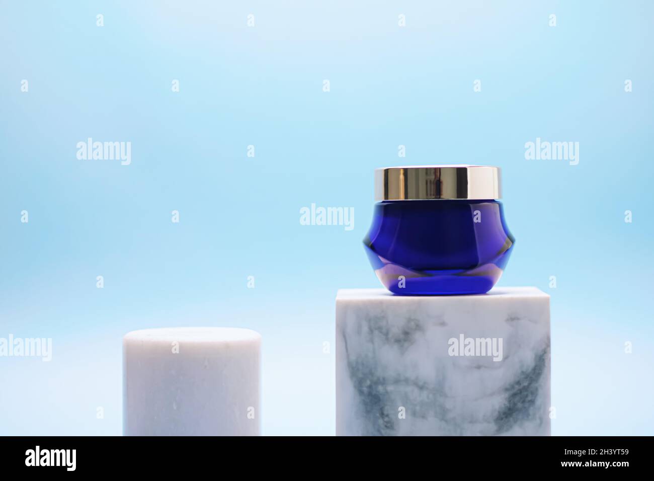 Facial cream jar on blue background, luxury skincare products, beauty ...