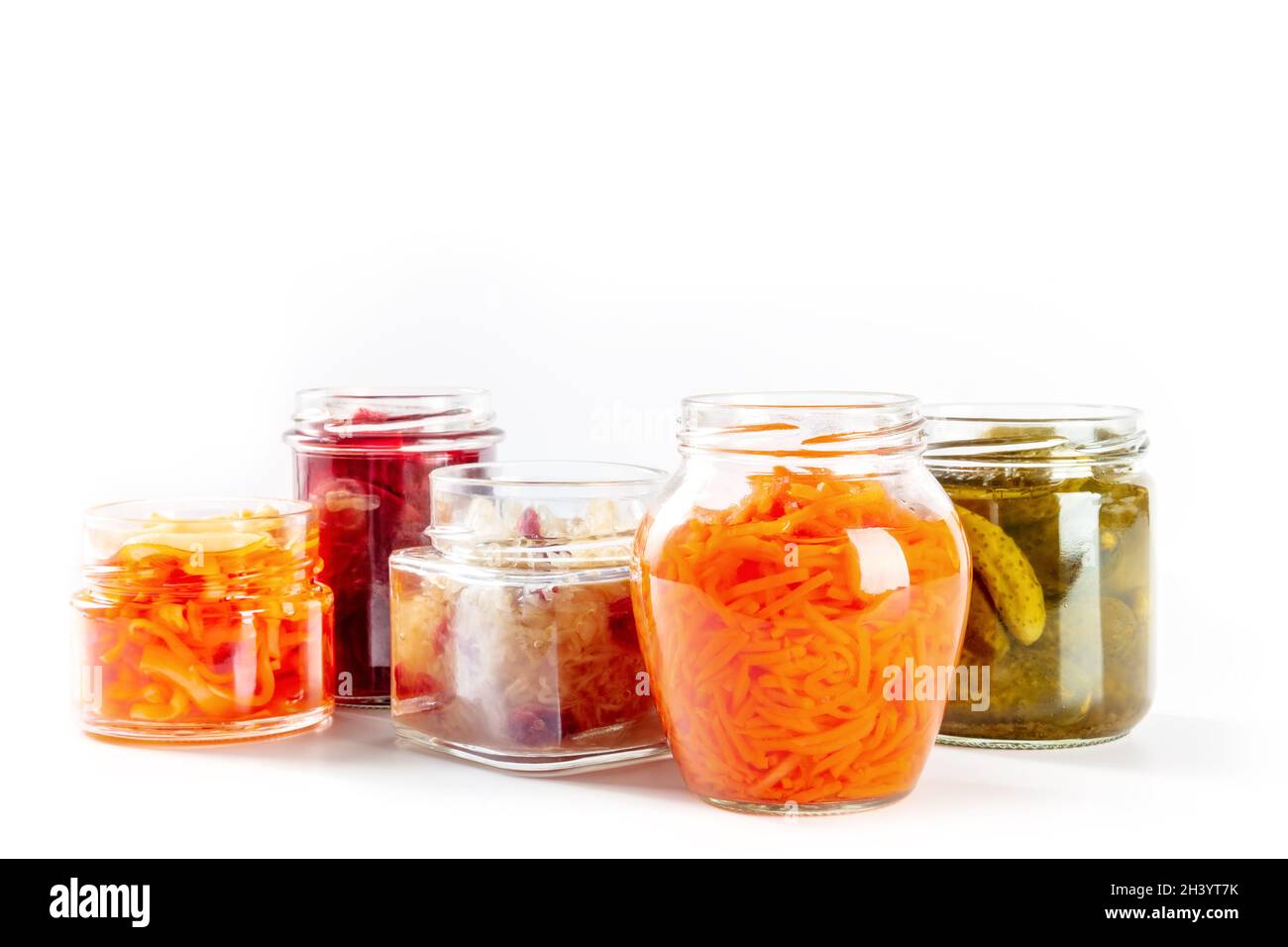 Fermented, probiotic food on a white background. Canned vegetables ...