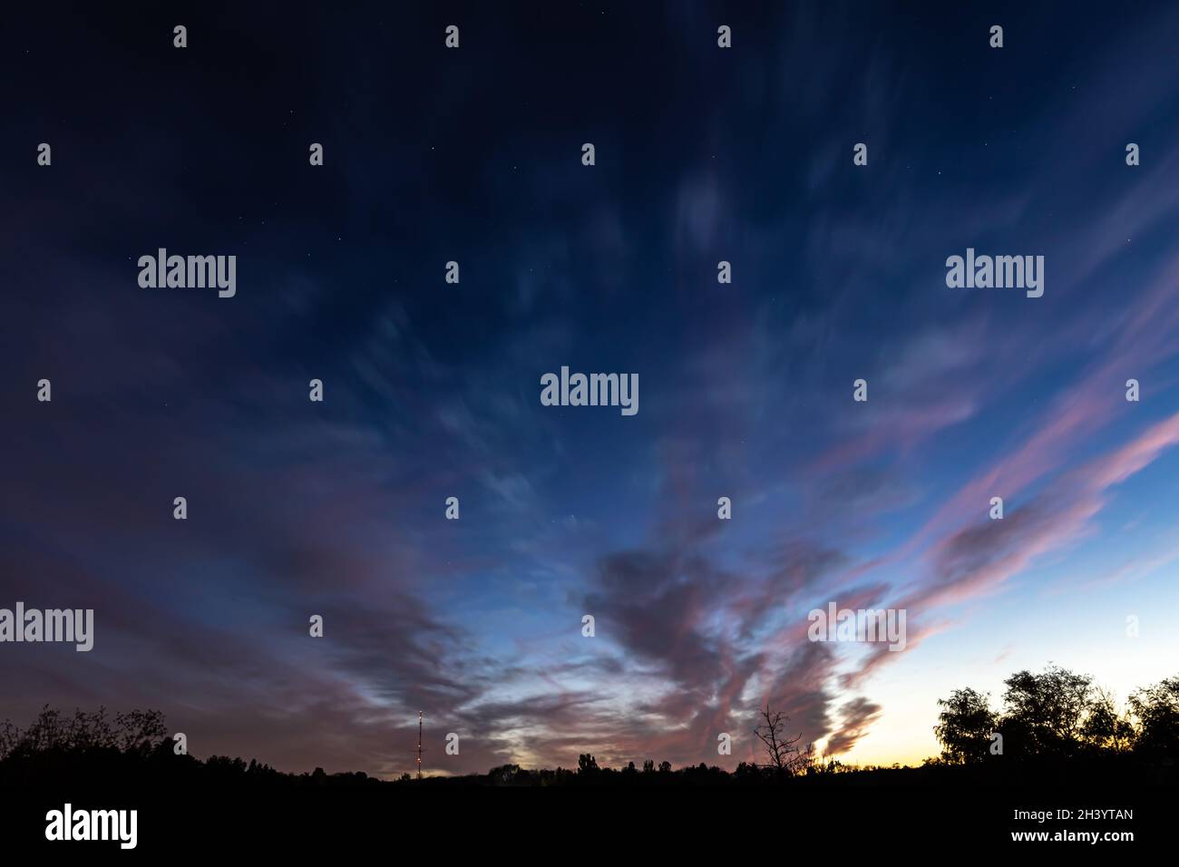 Bright contrasting blue sky with color gradient Stock Photo - Alamy