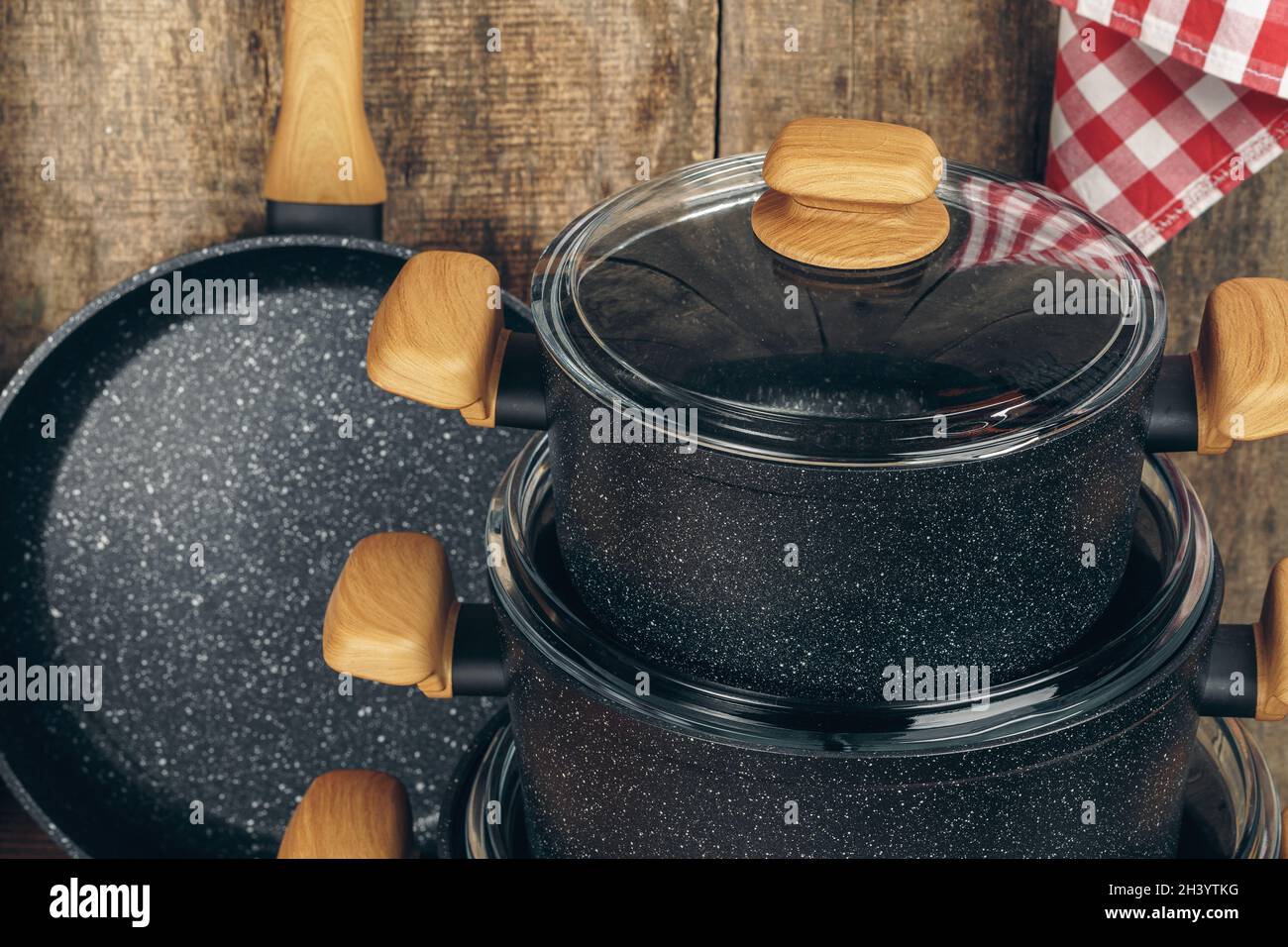 Set of cookware utensils on a kitchen counter Stock Photo - Alamy
