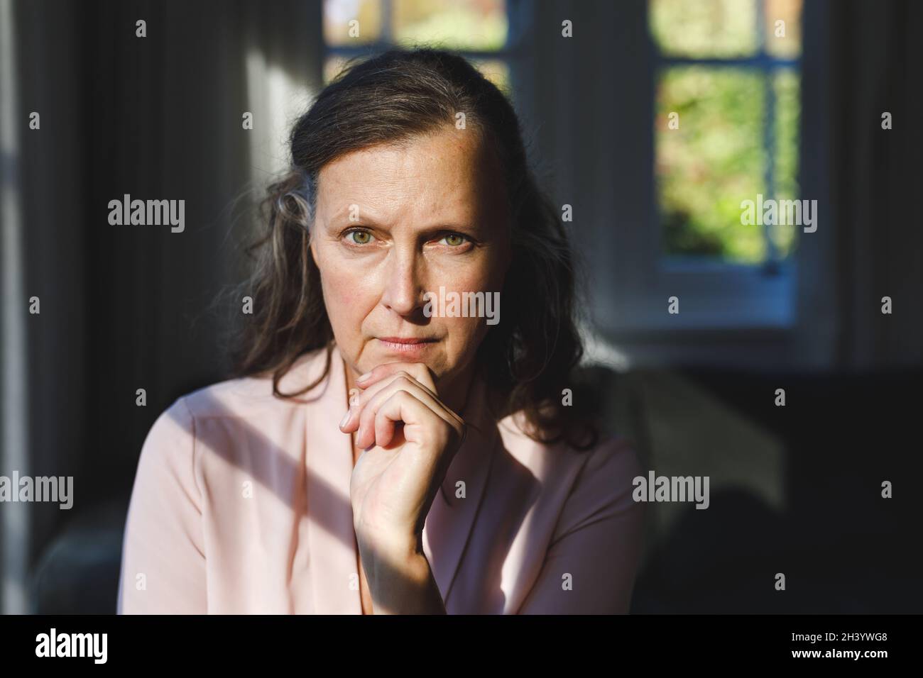 In camera looking brood hi-res stock photography and images - Alamy