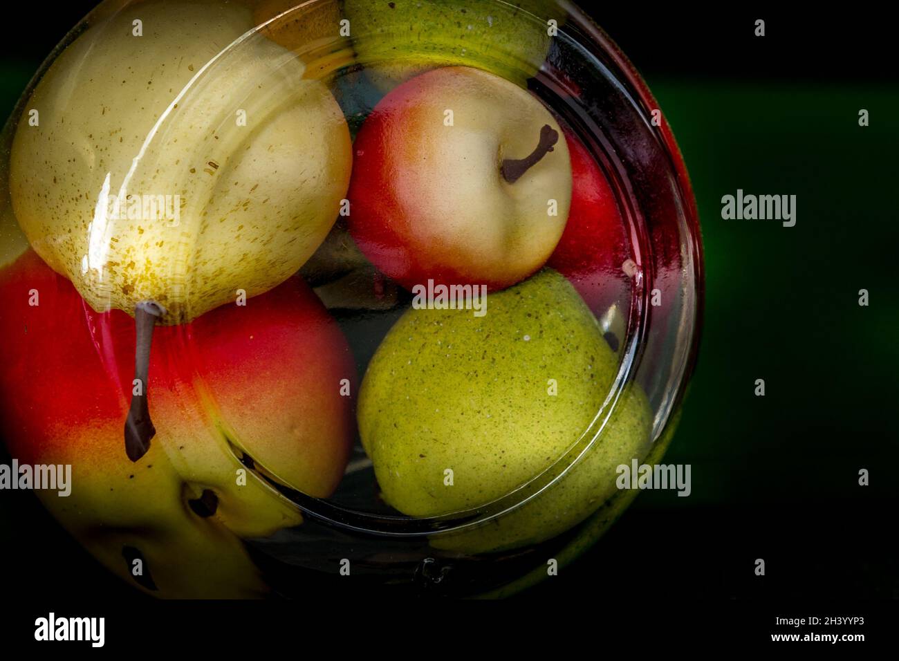 Preserved canned apples and pear in big glass jar Stock Photo - Alamy