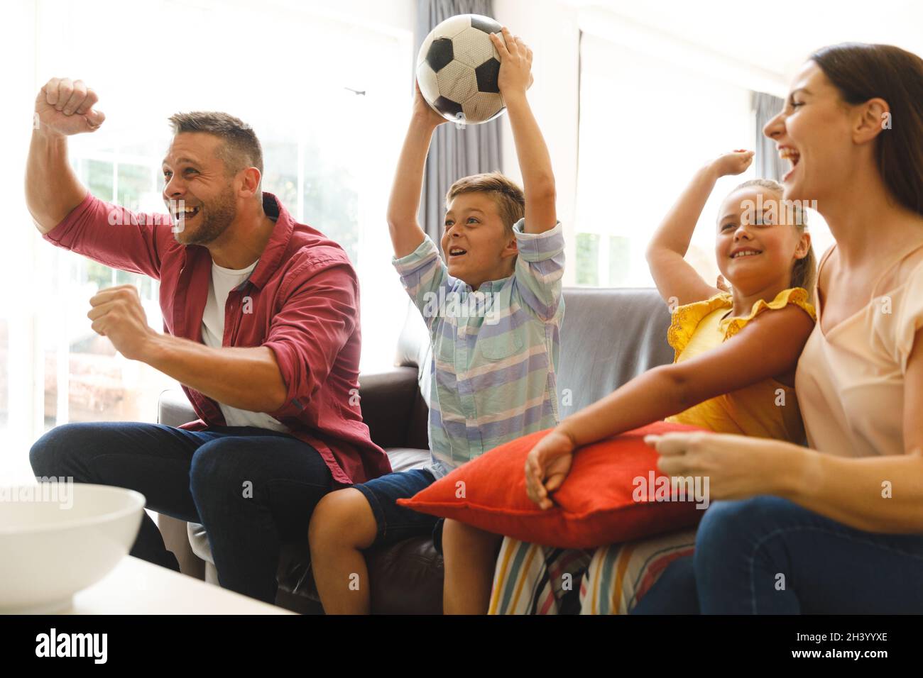 Child football parent match hi-res stock photography and images - Alamy