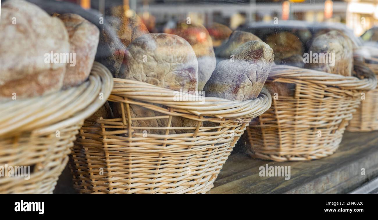 Bakery interior with glass display counters full of scrumptious bread ...