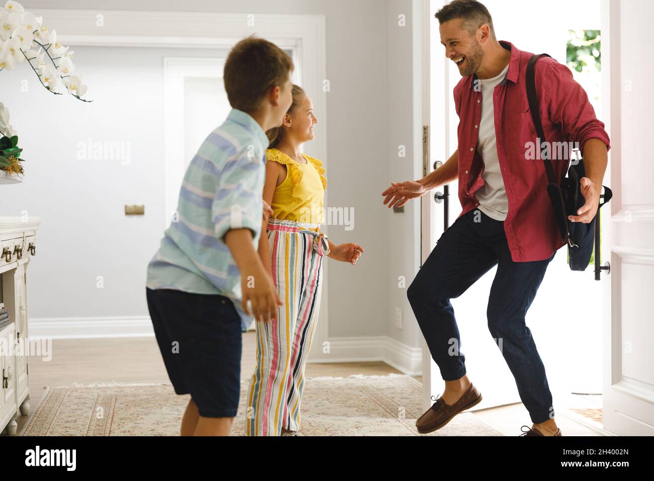 Son welcoming father home hi-res stock photography and images - Alamy