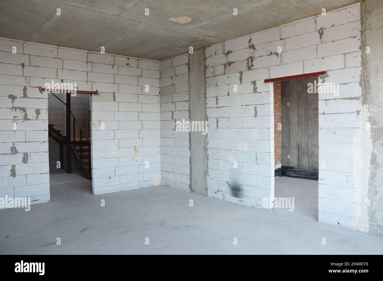 Interior room under construction, metal door lintels. Wall without ...