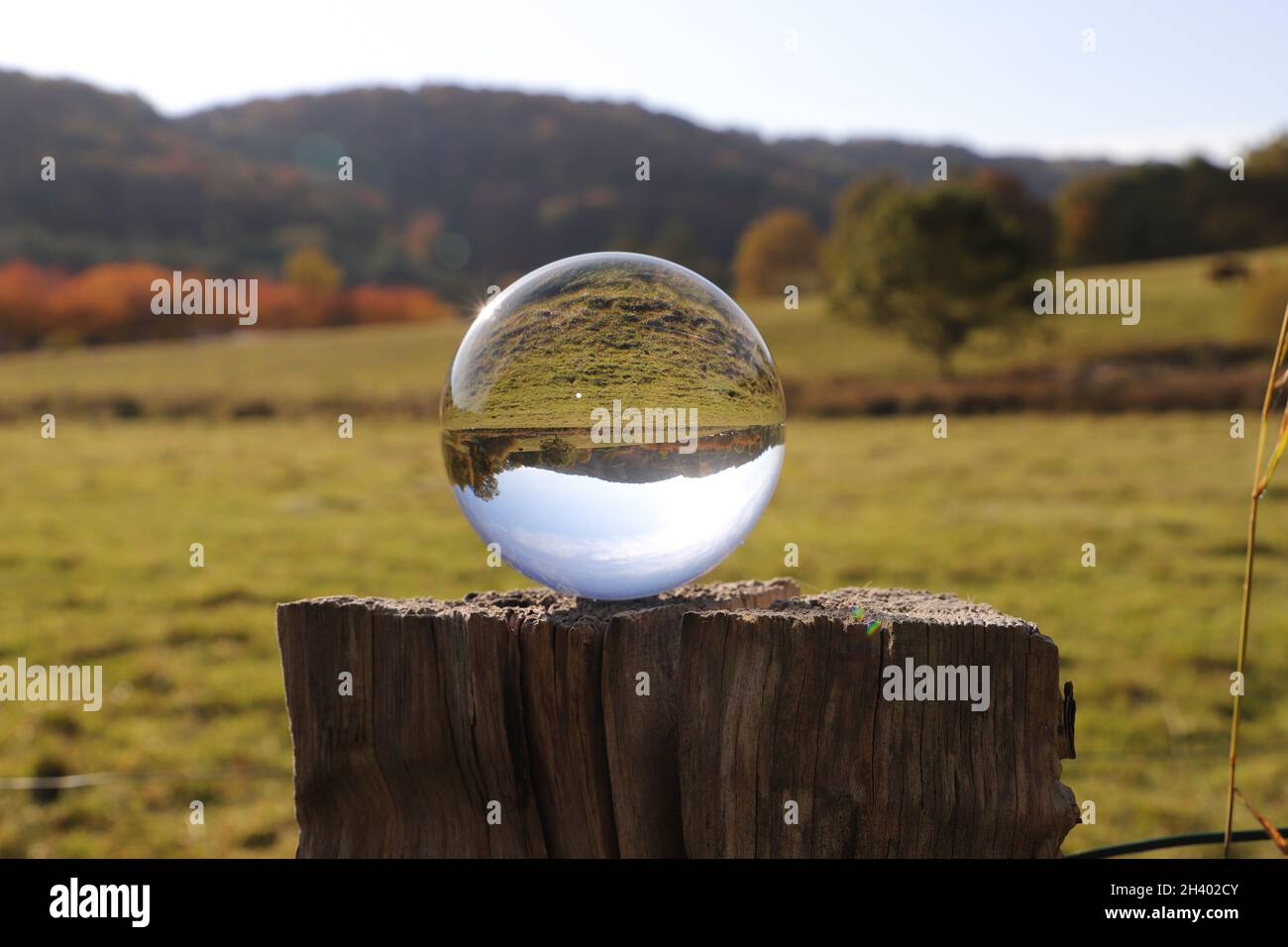 a beautiful landscape photographed through a lens ball Stock Photo - Alamy