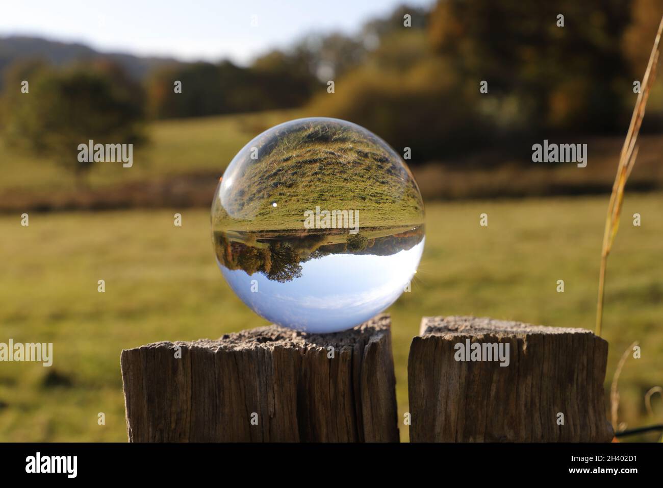 a beautiful landscape photographed through a lens ball Stock Photo - Alamy