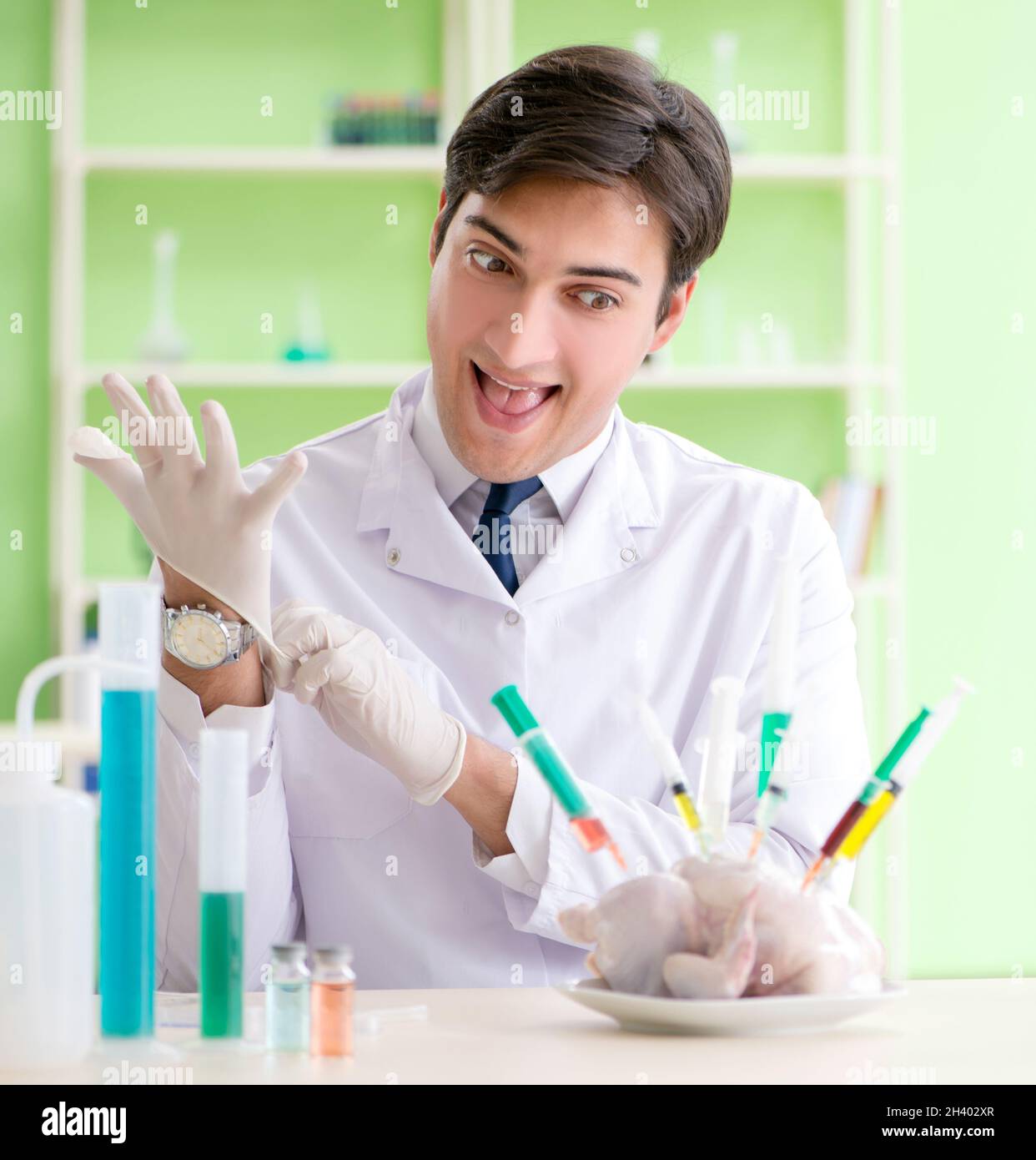 Lab assistant testing GMO chicken Stock Photo - Alamy
