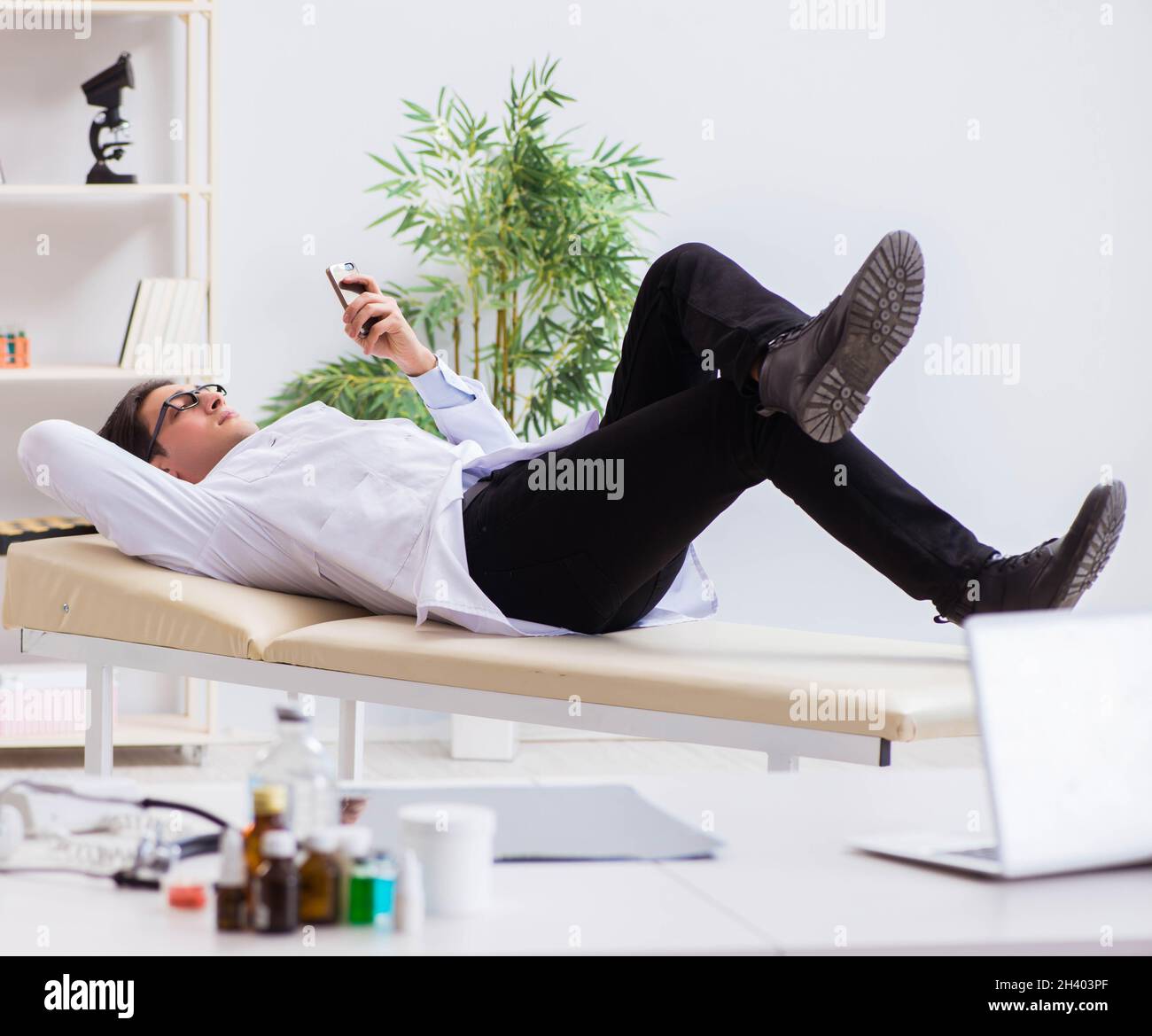 Doctor relaxing after complex surgery in hospital Stock Photo - Alamy