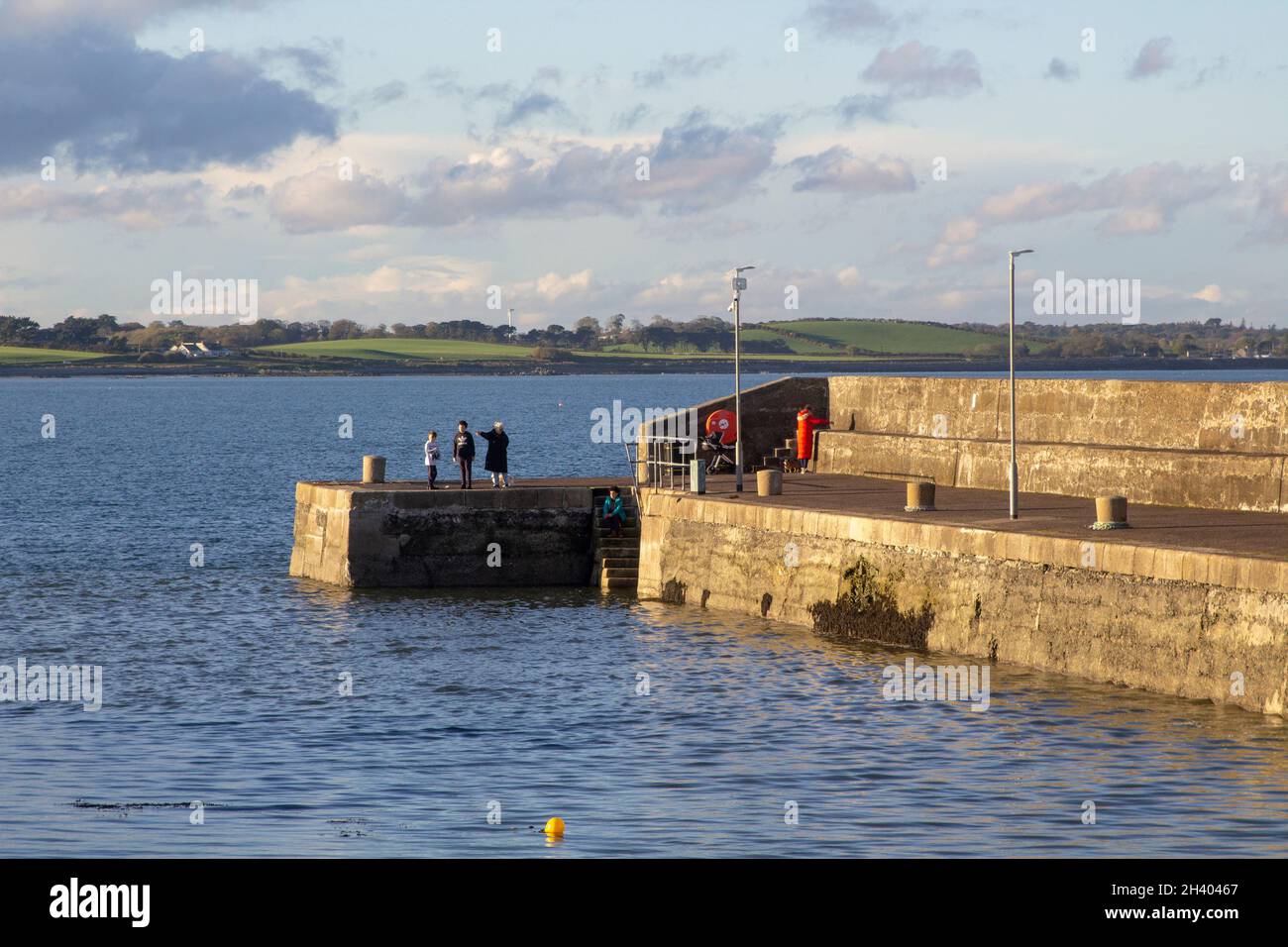 30 October 2021 Visitors enjoy the scenic pier and harbour at the ...