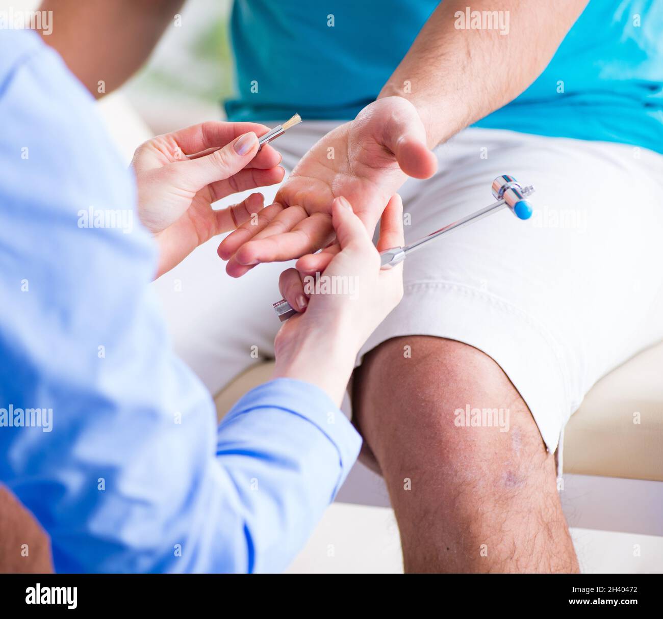 Checking doctor reflex hi-res stock photography and images - Alamy