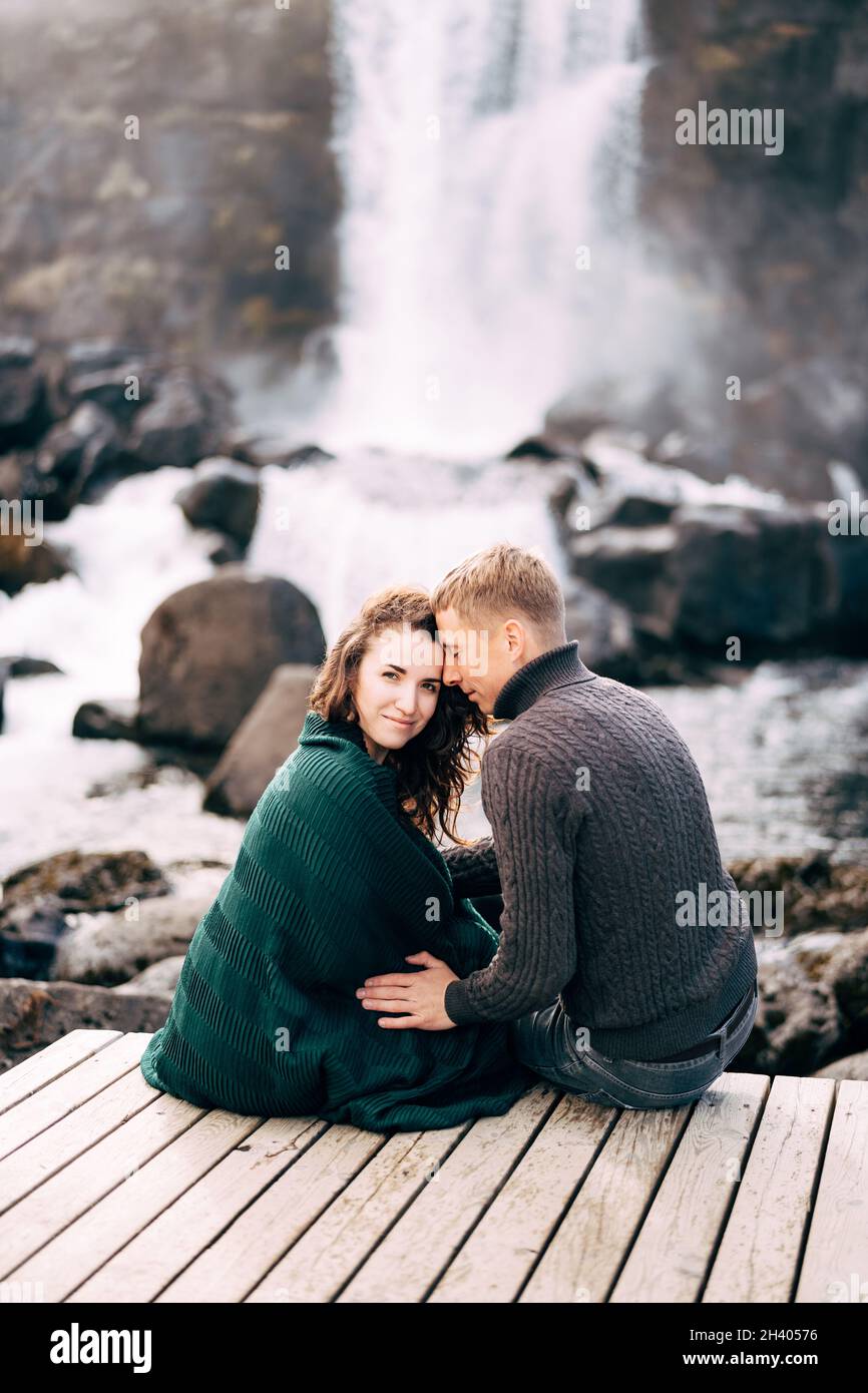 Boy girl sitting on bridge hi-res stock photography and images - Alamy