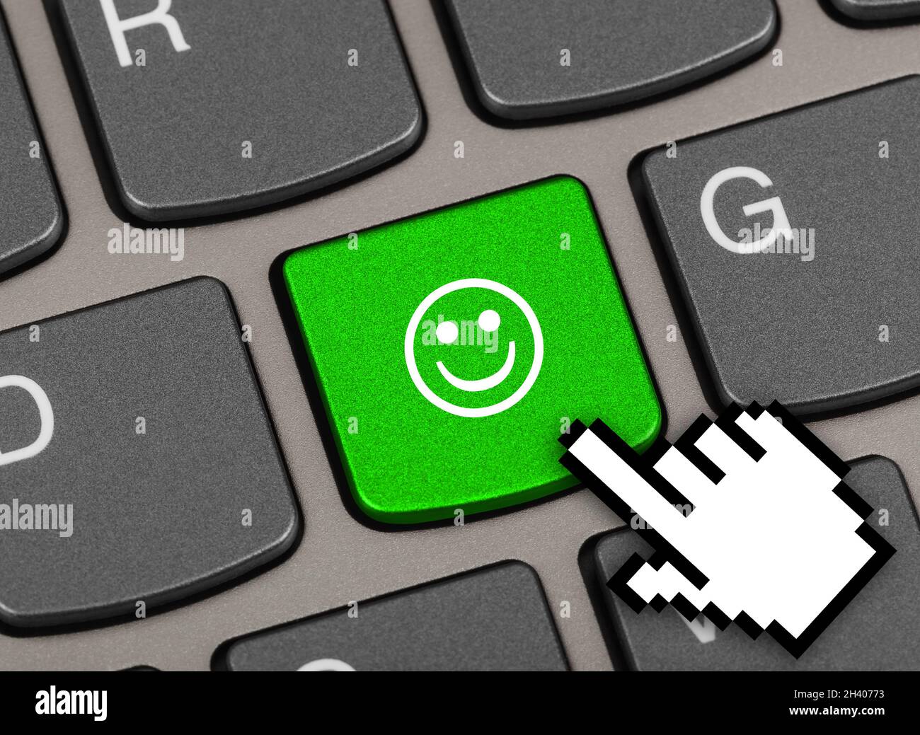 Computer keyboard with smile key Stock Photo - Alamy