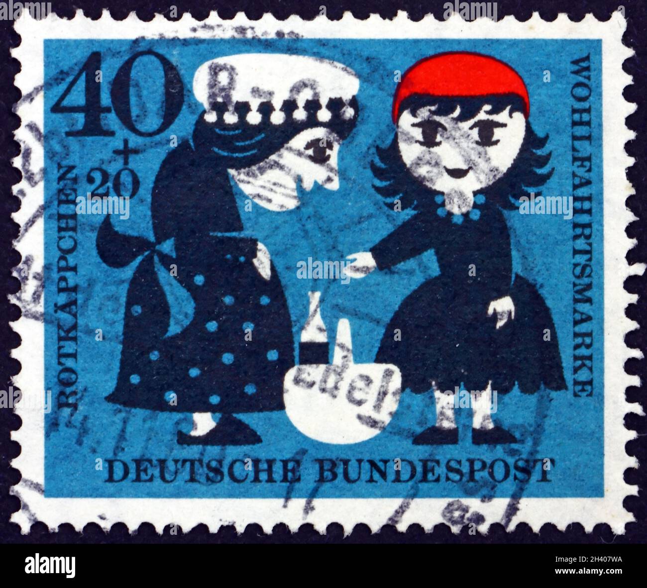 GERMANY - CIRCA 1960: a stamp printed in the Germany shows Little Red ...