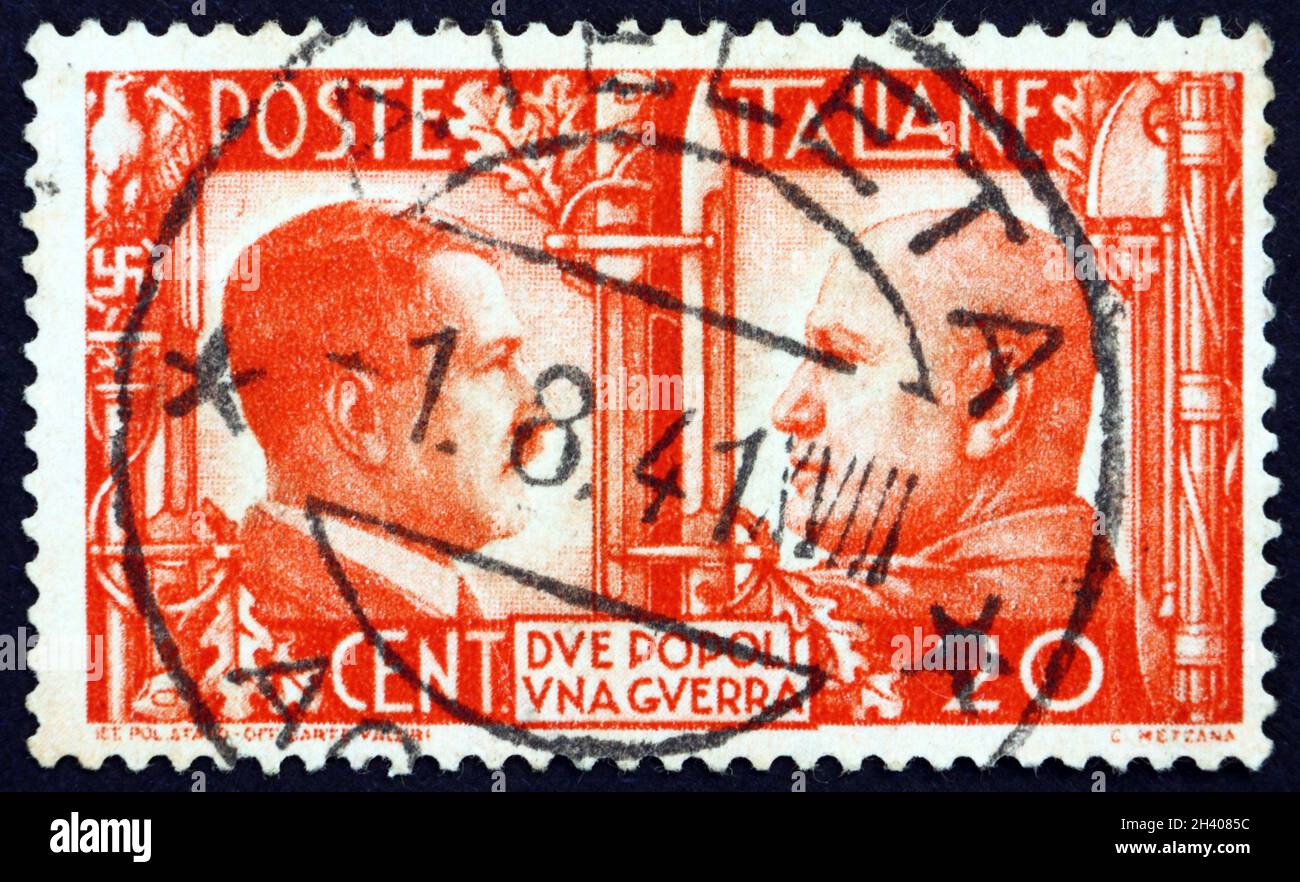 ITALY - CIRCA 1941: a stamp printed in Italy shows Adolf Hitler and ...