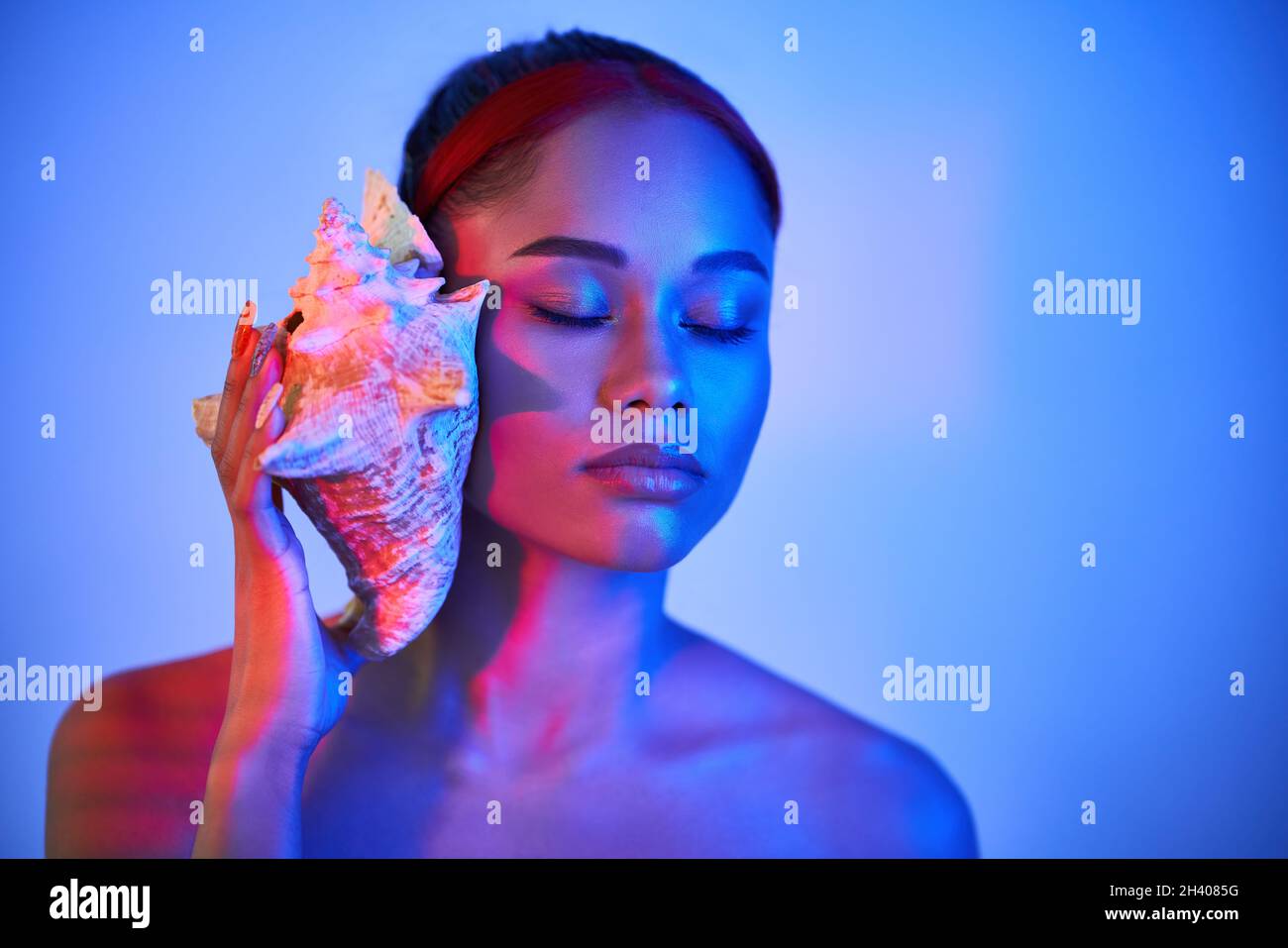 Seashell ear hi-res stock photography and images - Alamy