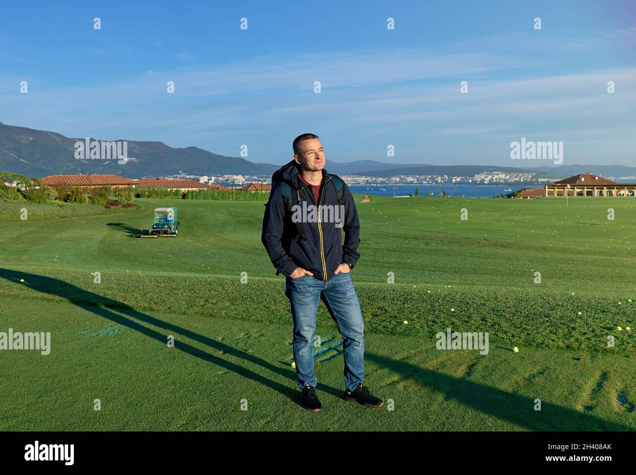 Senior man holding golf club hi-res stock photography and images - Alamy