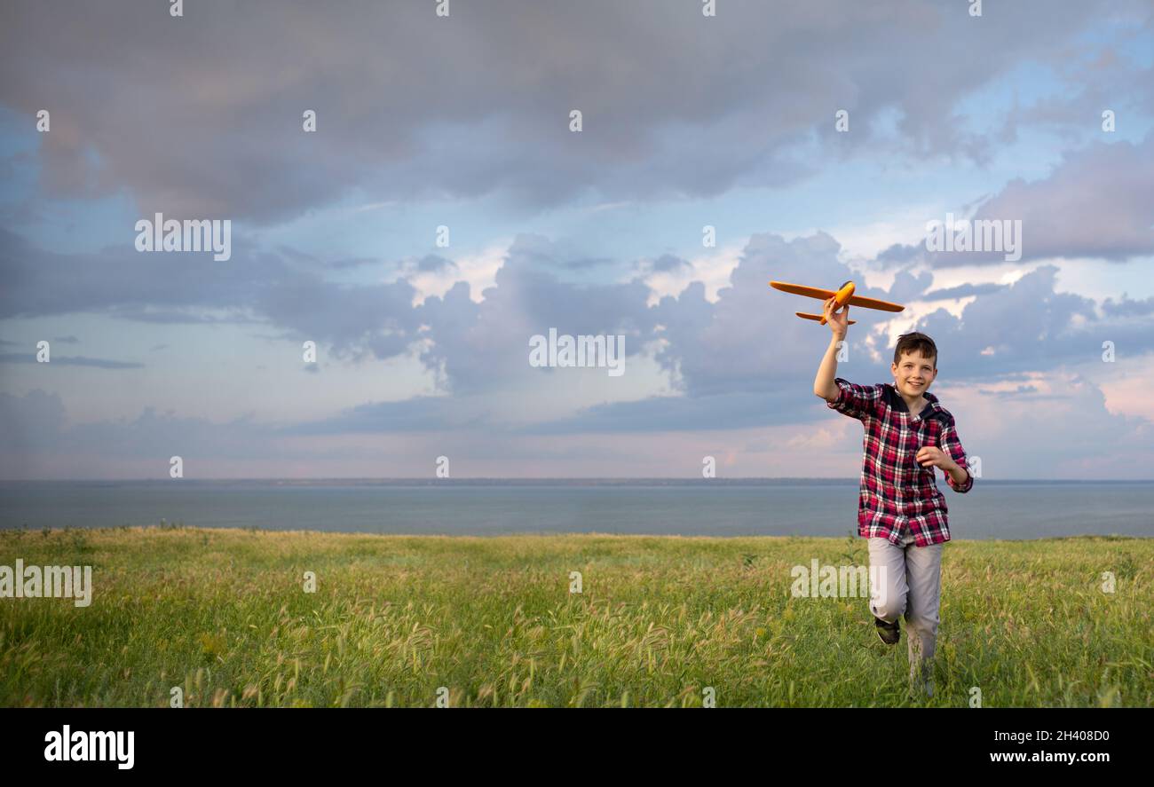 Boy Launching Airplane High Resolution Stock Photography and Images - Alamy