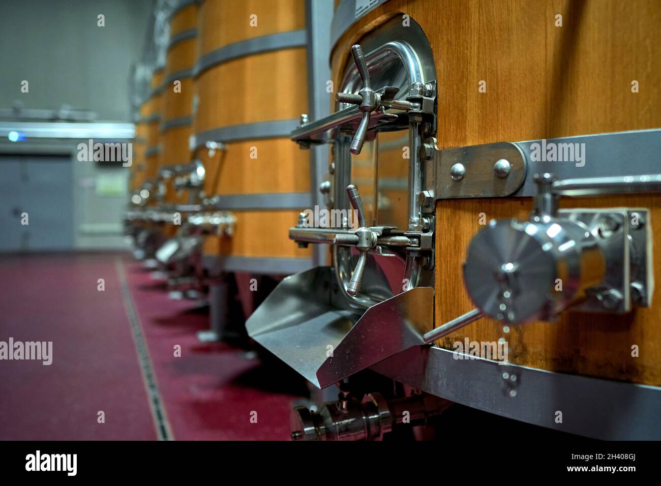 huge containers at the wine production plant Stock Photo - Alamy