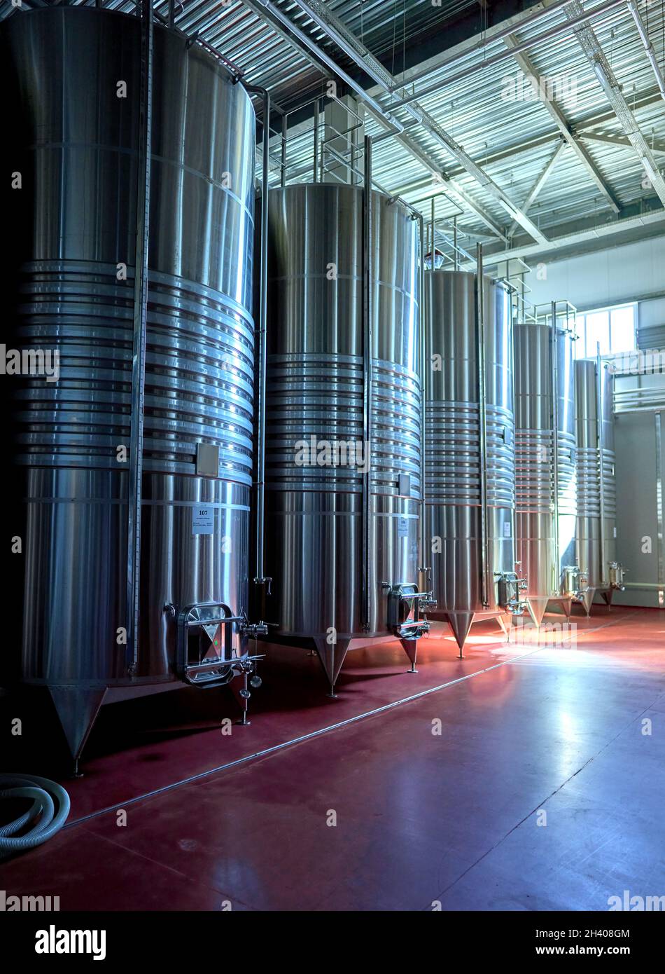 huge containers at the wine production plant Stock Photo - Alamy