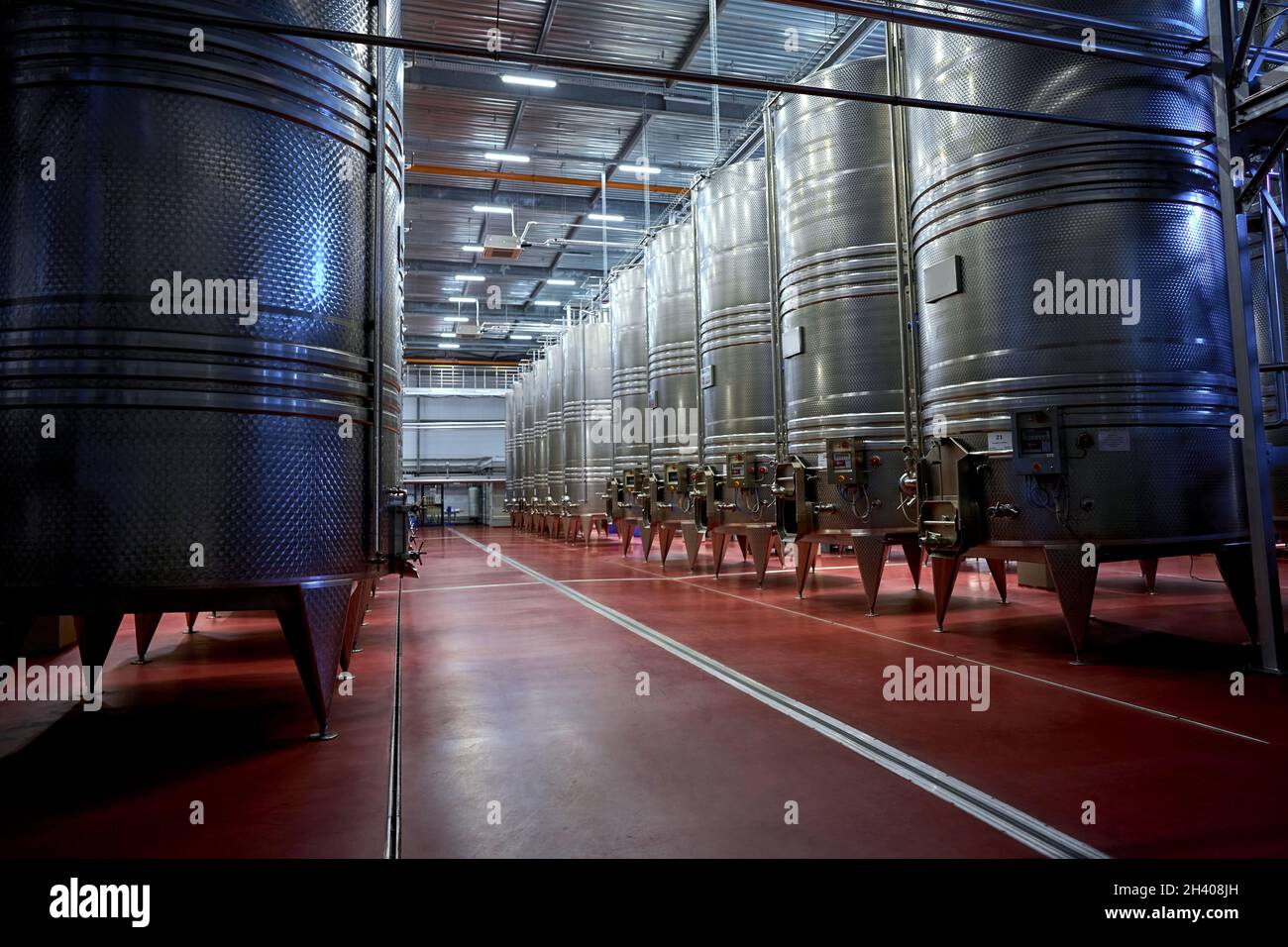 huge containers at the wine production plant Stock Photo - Alamy