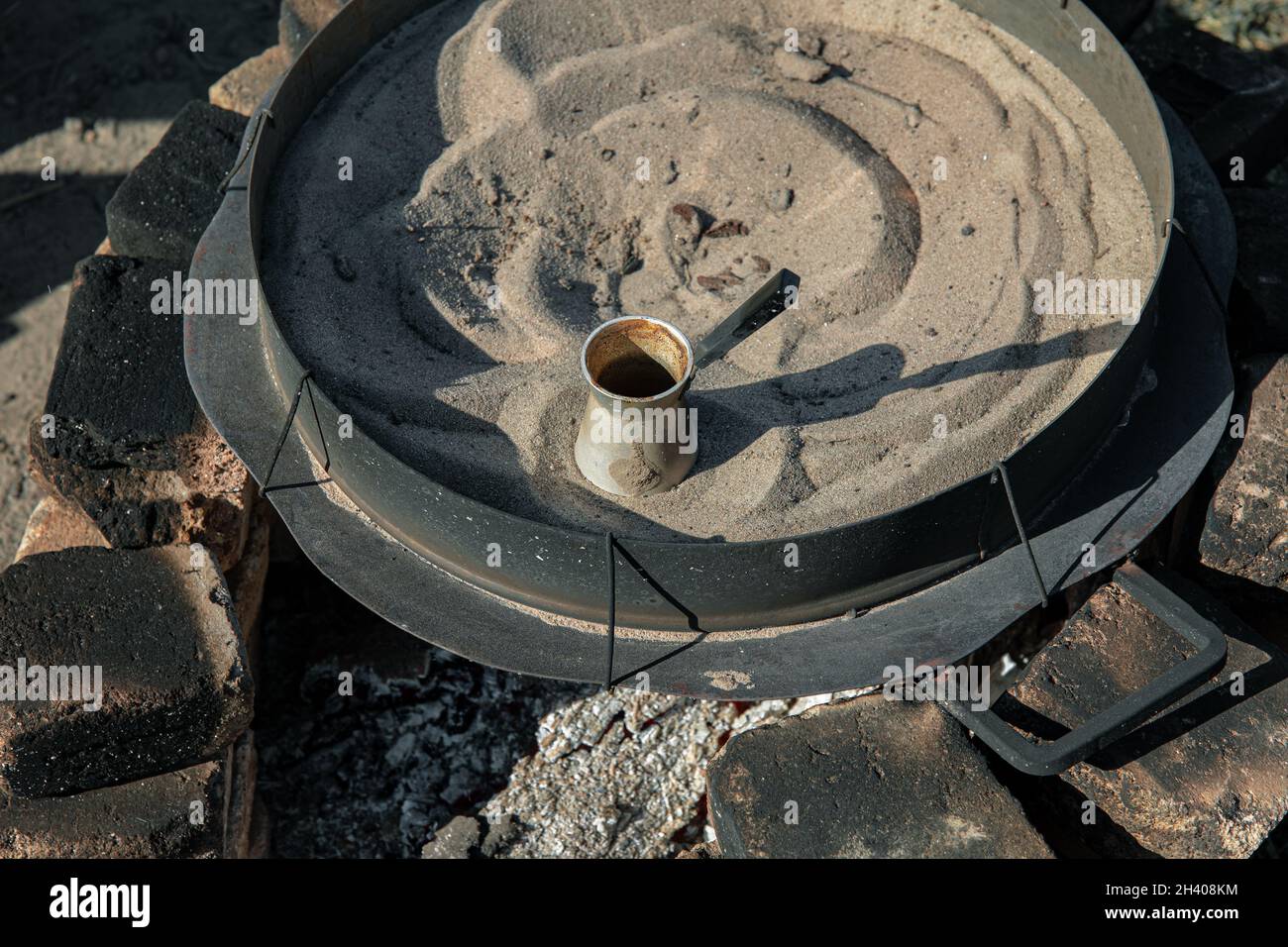 Turkish coffee prepared by cooking in the sand Stock Photo - Alamy
