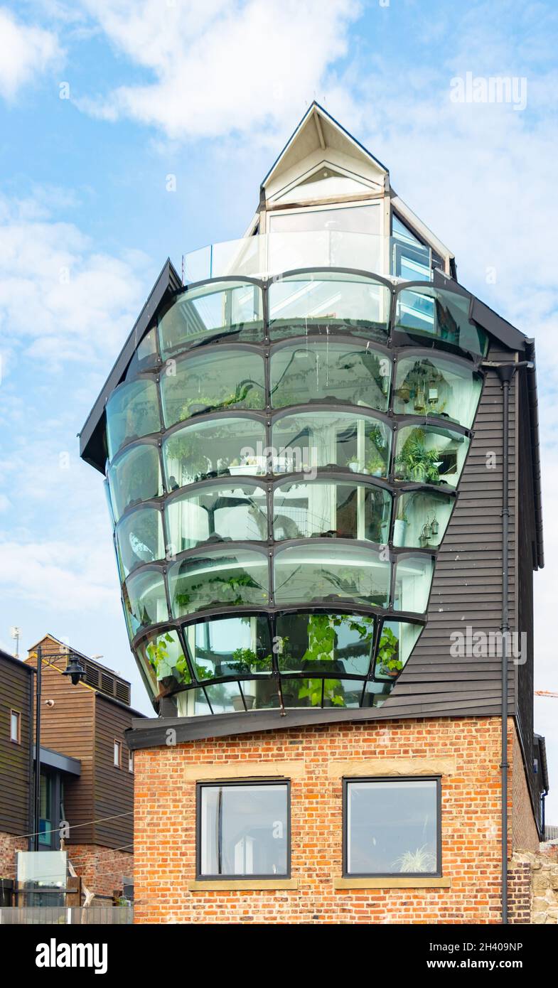 modern house and architects studio with large glass windows possibly ...