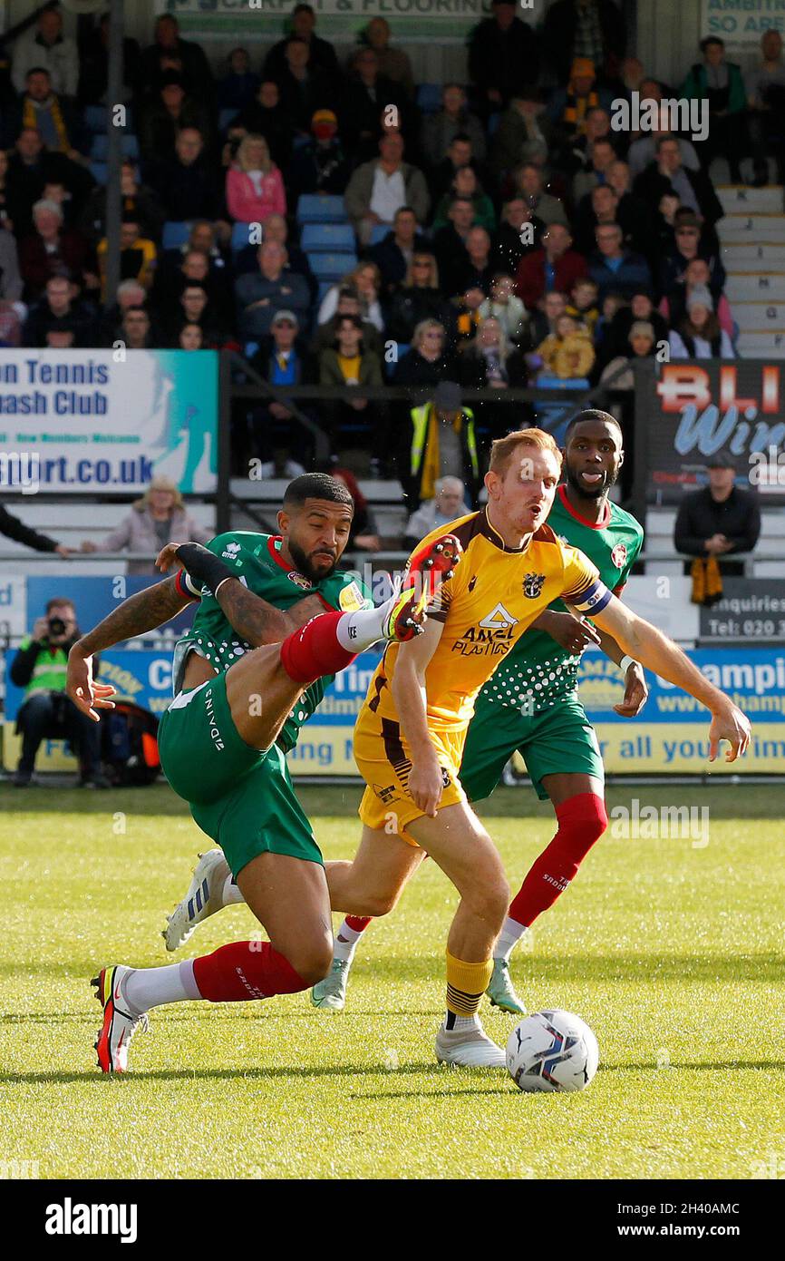 Sutton, UK. 30th Oct, 2021. Joss Labadie of Walsall and Robert Milsom ...