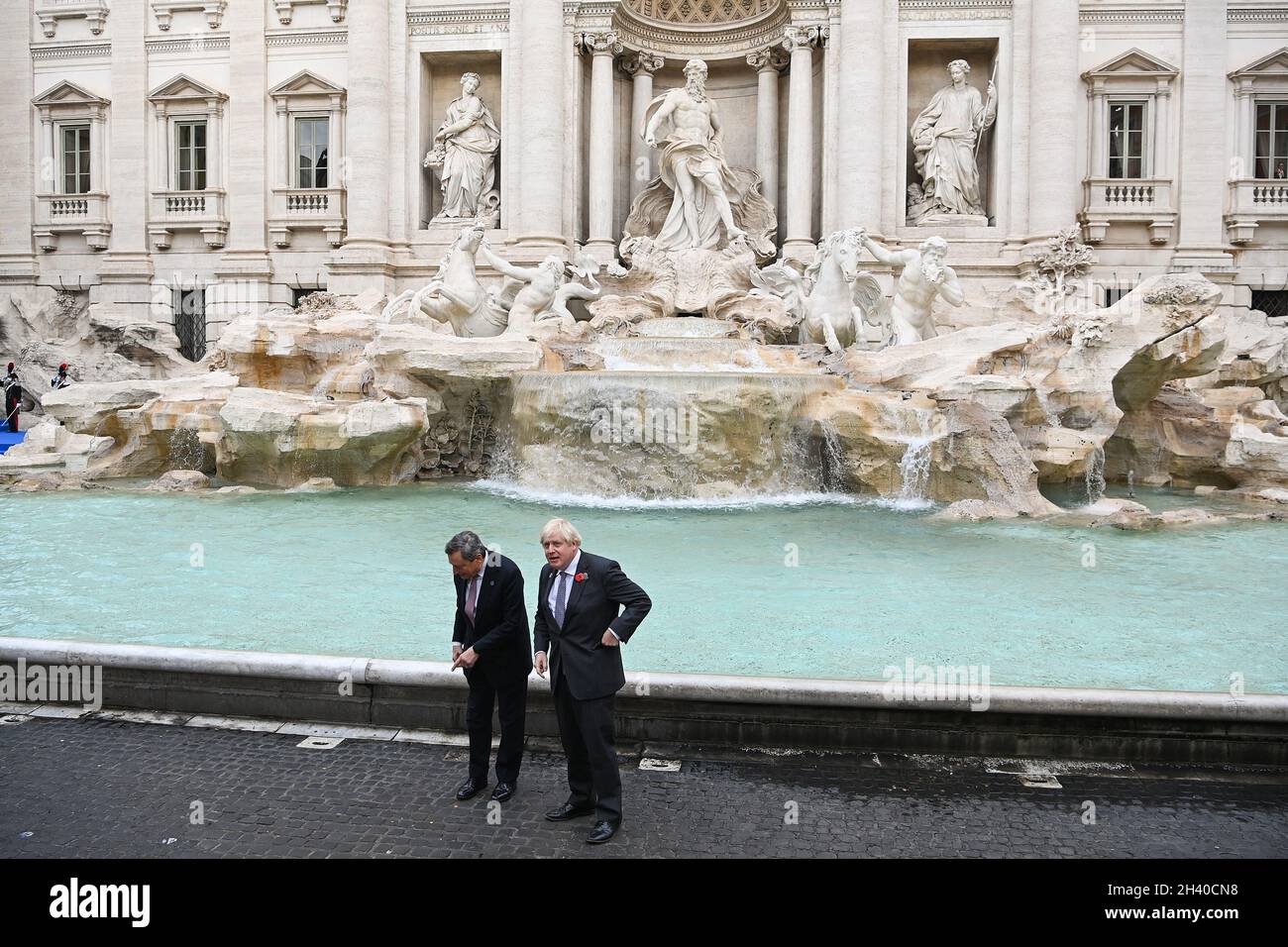 Prime Minister Boris Johnson stands with Italian Prime Minister Mario ...