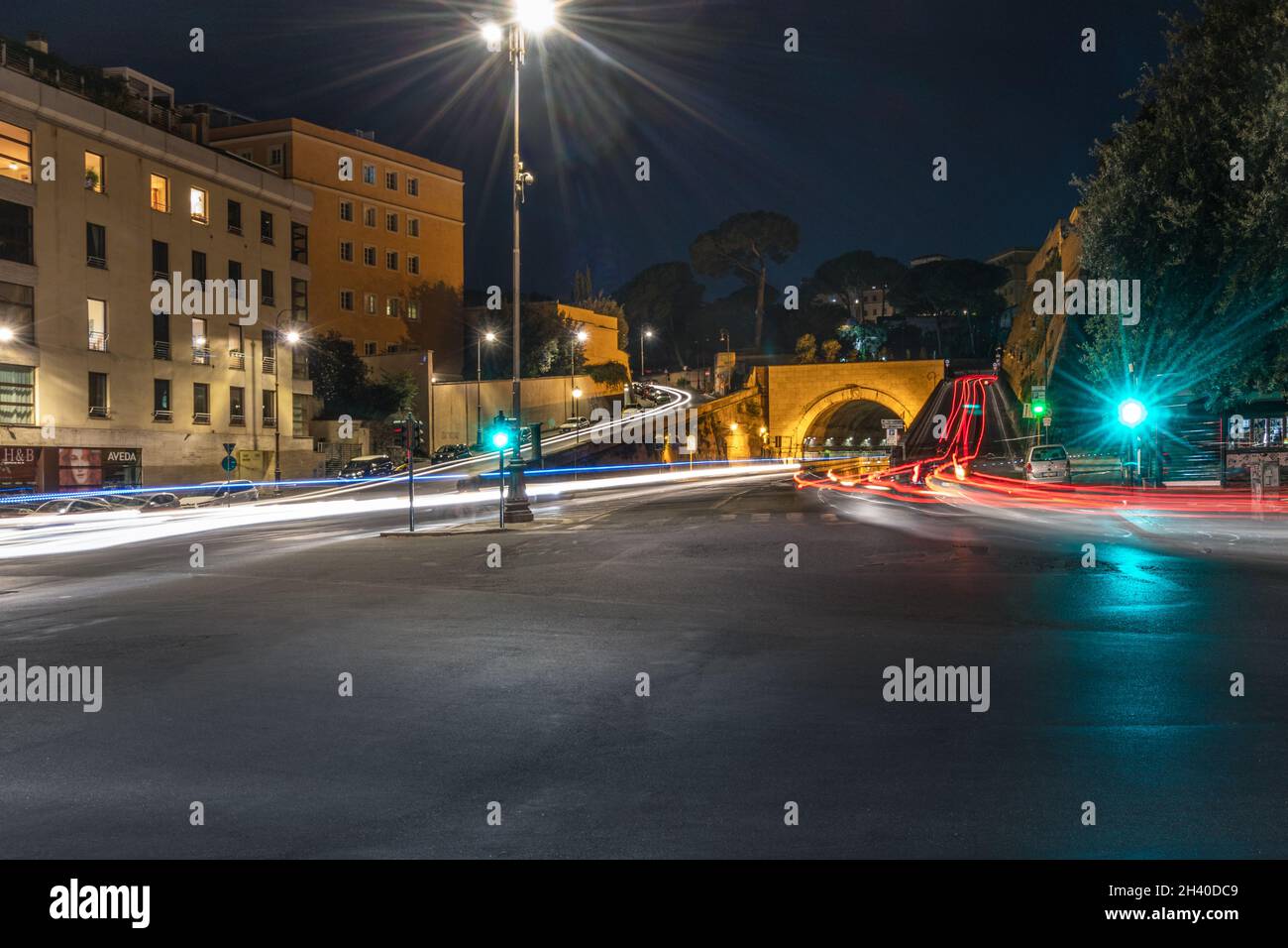 Long exposure photography traffic in the city Rome colorful bus and ...
