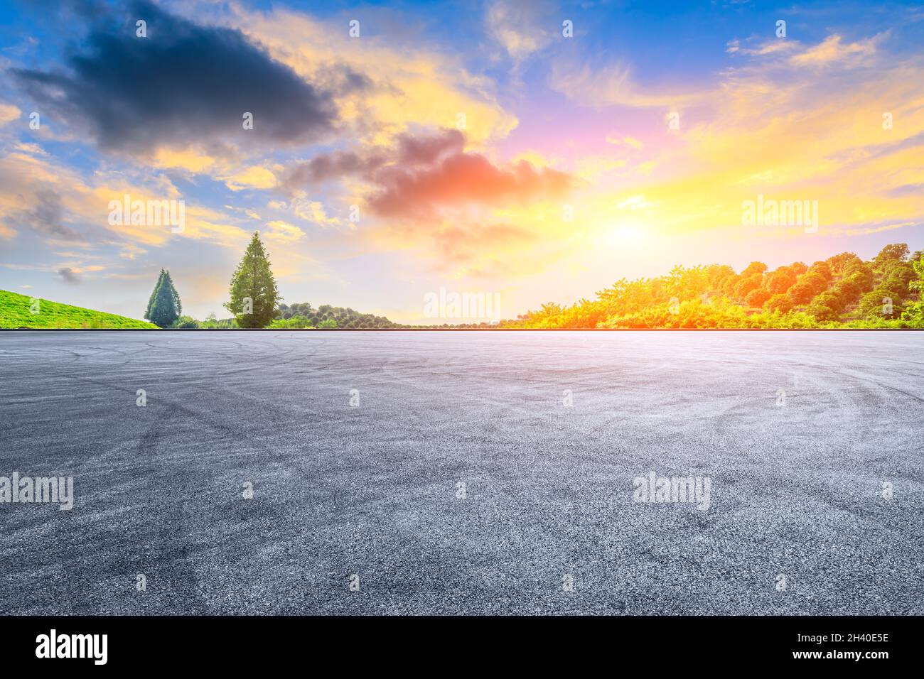 Race track road and green tea plantations with mountain natural scenery ...