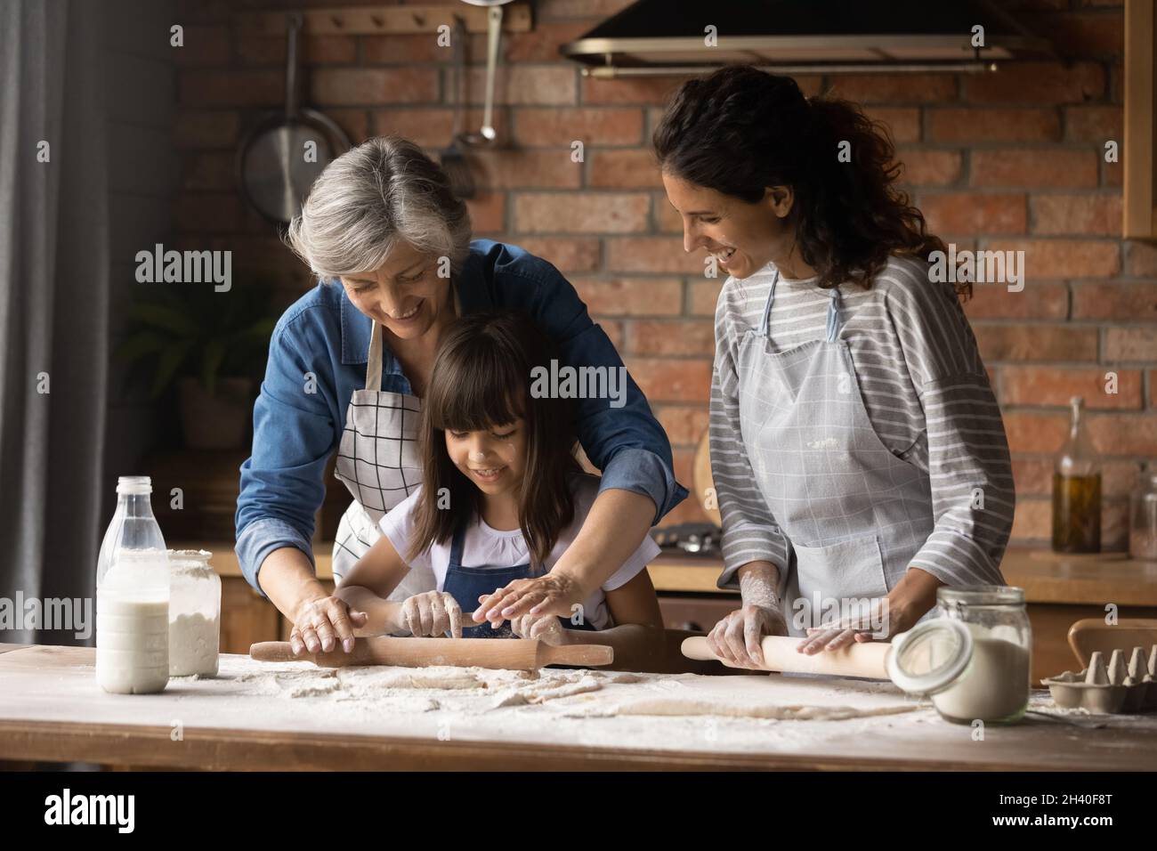 Woman girl cooking hispanic hi-res stock photography and images - Alamy