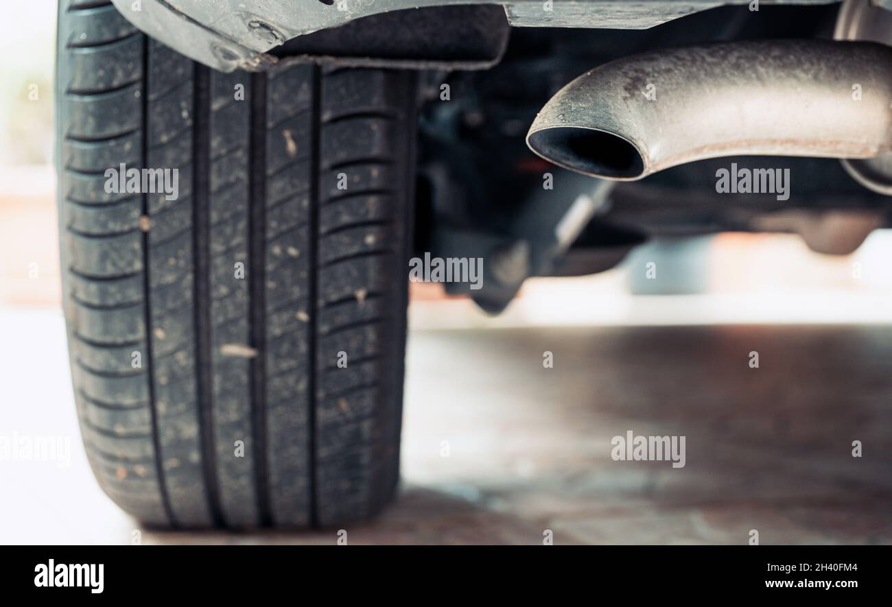 exhaust pipe of a car. Symbolizing the decline of internal combustion ...